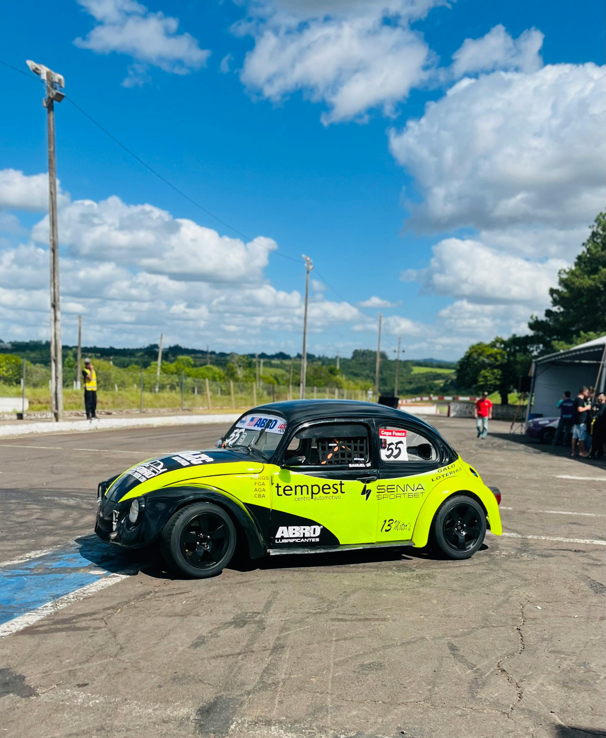Racing Volkswagen Beetle at Parking Lot · Free Stock Photo