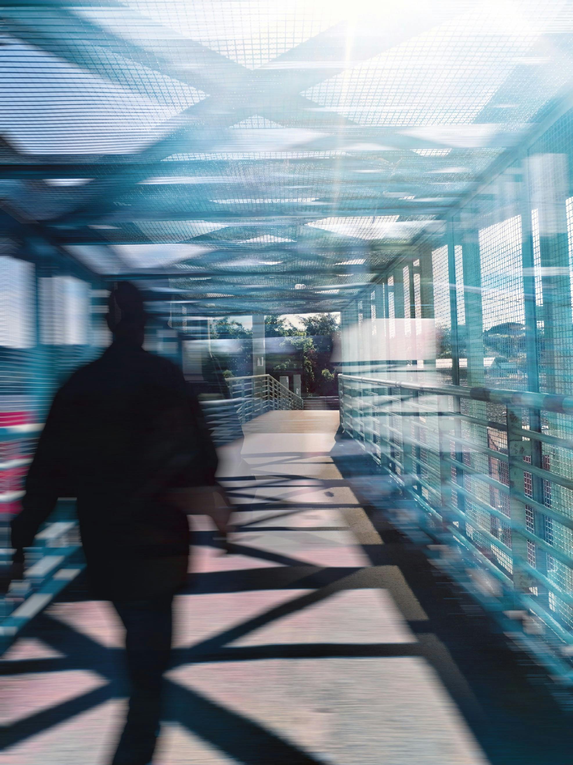 Passerby on the Footbridge · Free Stock Photo