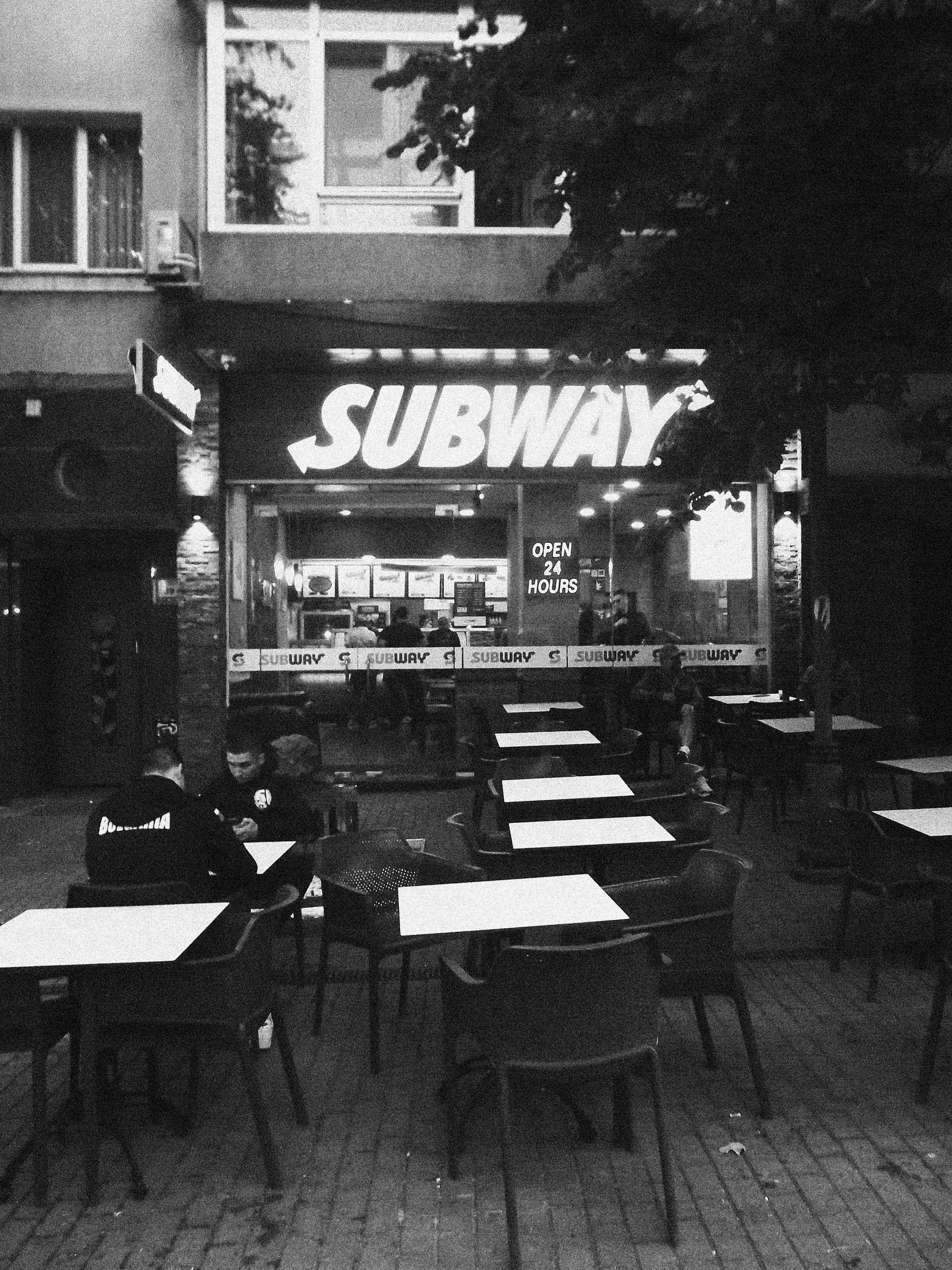 Chairs in Front of Fast Food Restaurant in Black and White · Free Stock ...