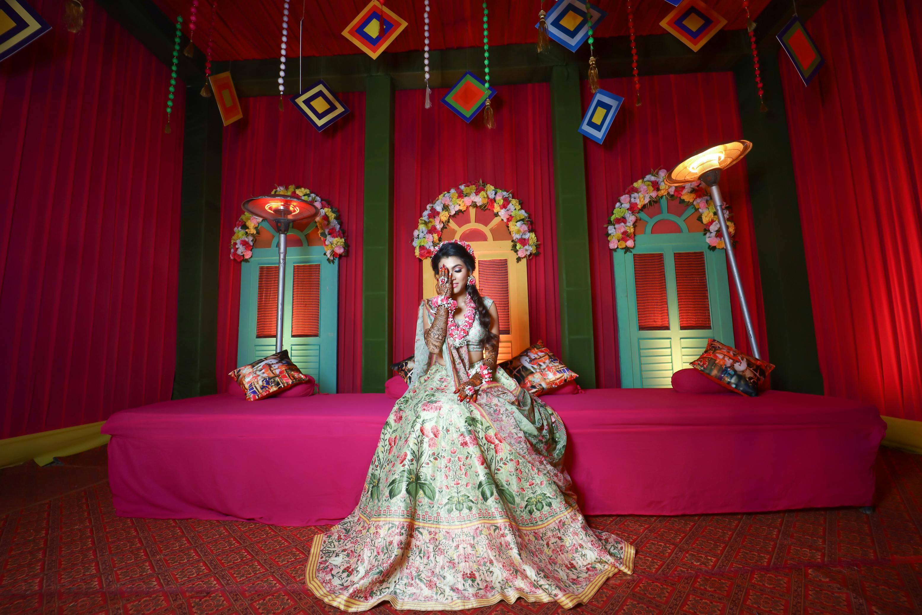 Bride Sitting in Traditional Clothing in Bedroom · Free Stock Photo
