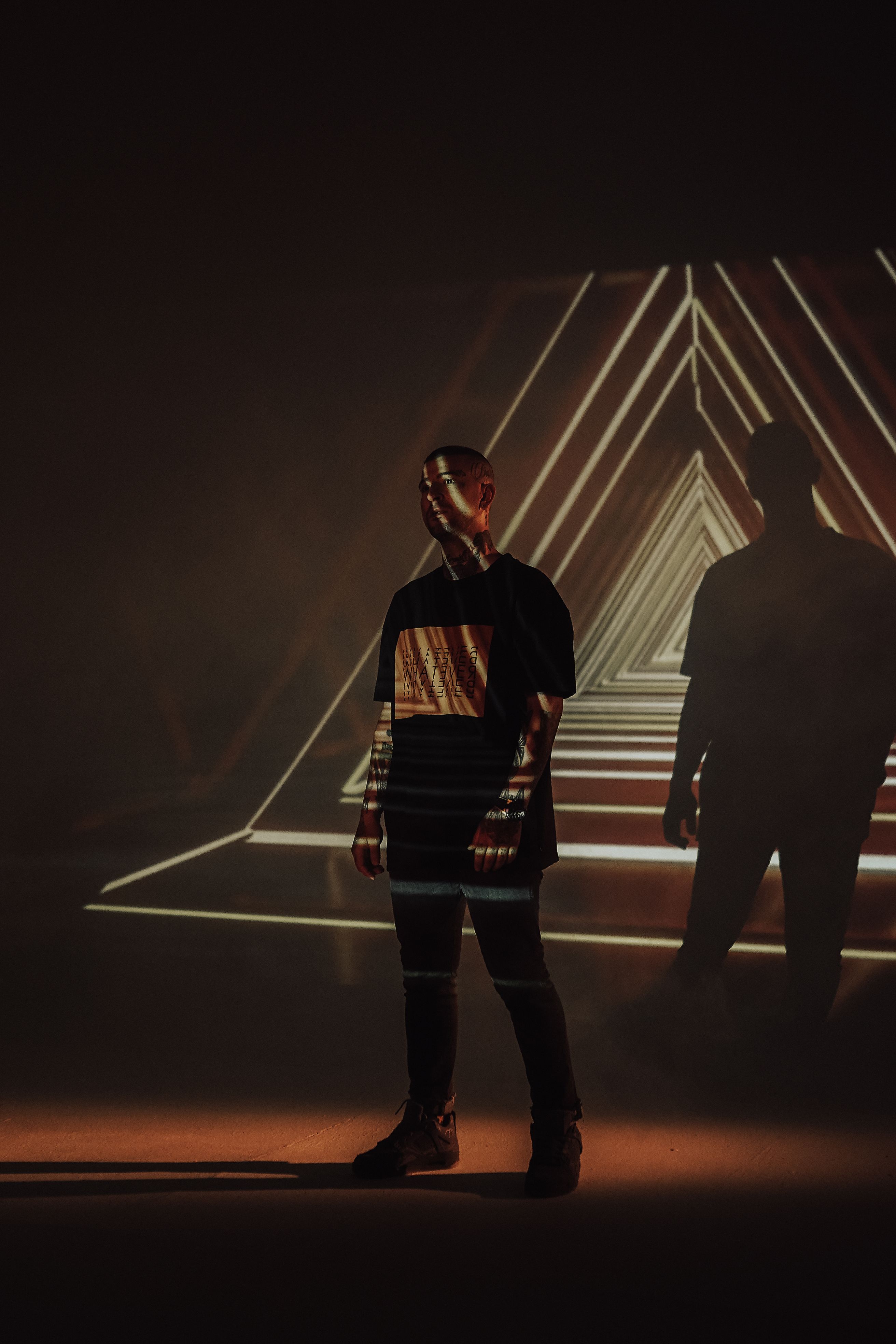 A Modern Studio Shot of a Man Illuminated by a Light Projection · Free ...