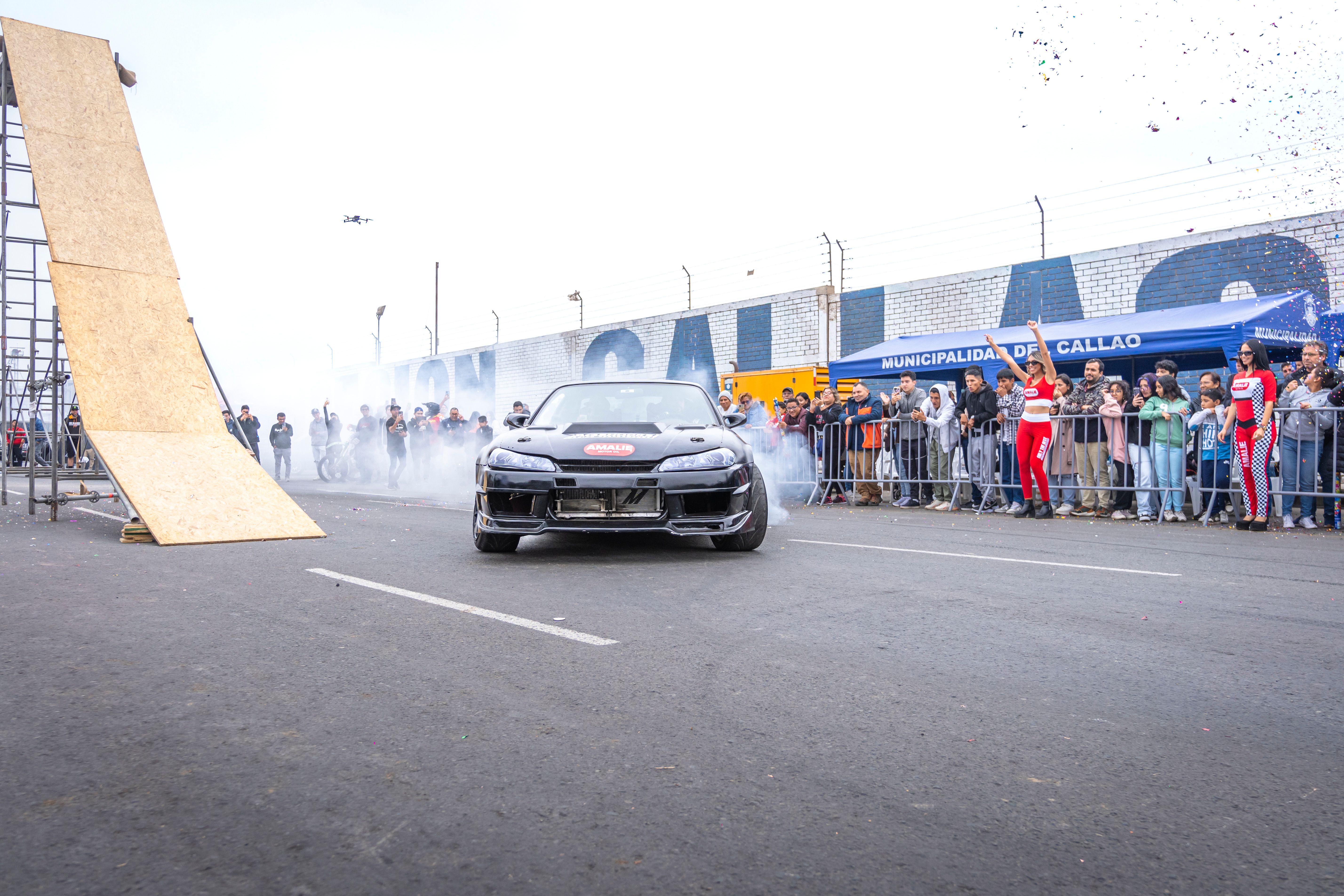 People Spectating a Drifting Car · Free Stock Photo