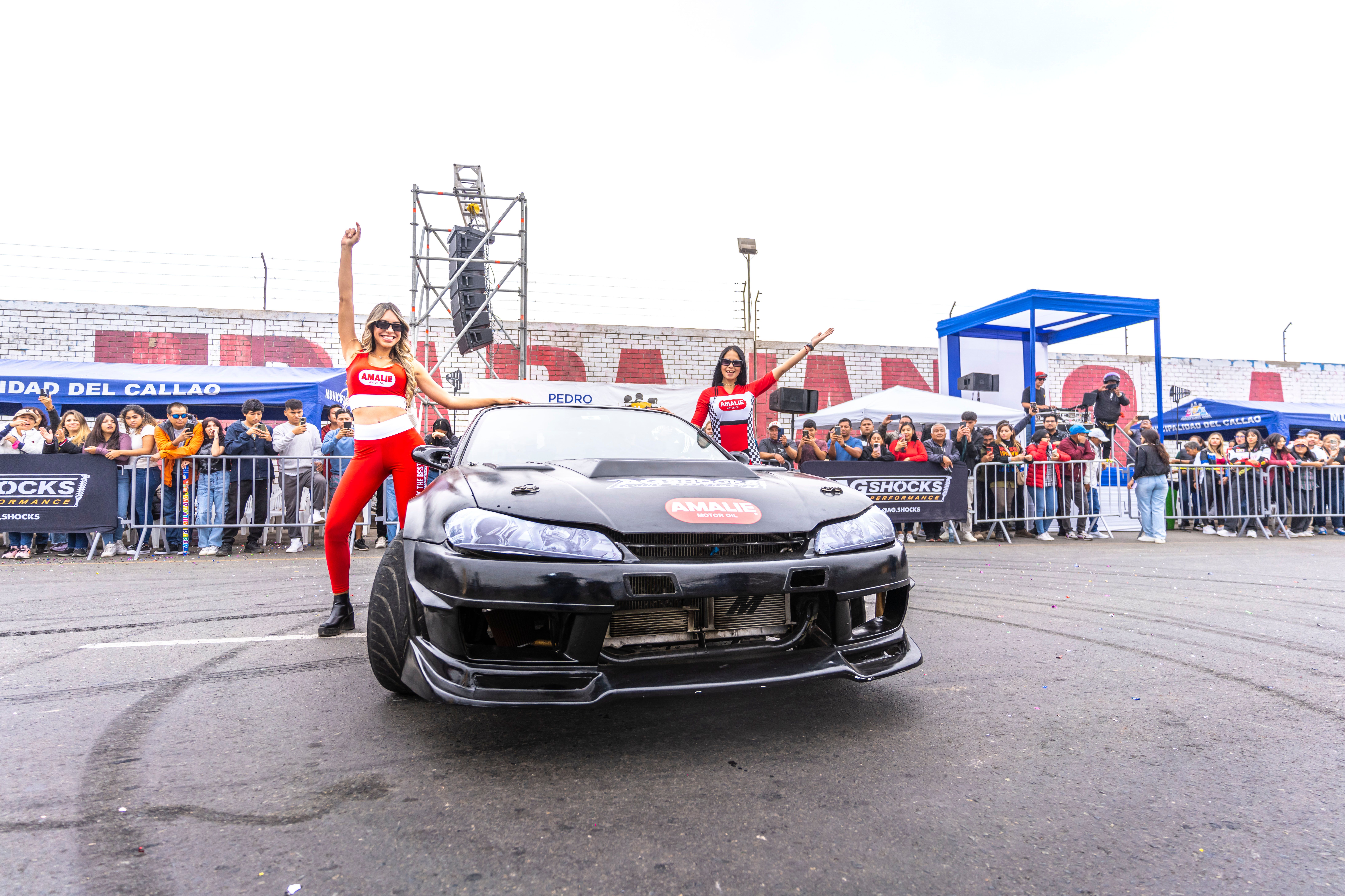 Women Posing on Black, Racing Car in Drifting Competition · Free Stock ...