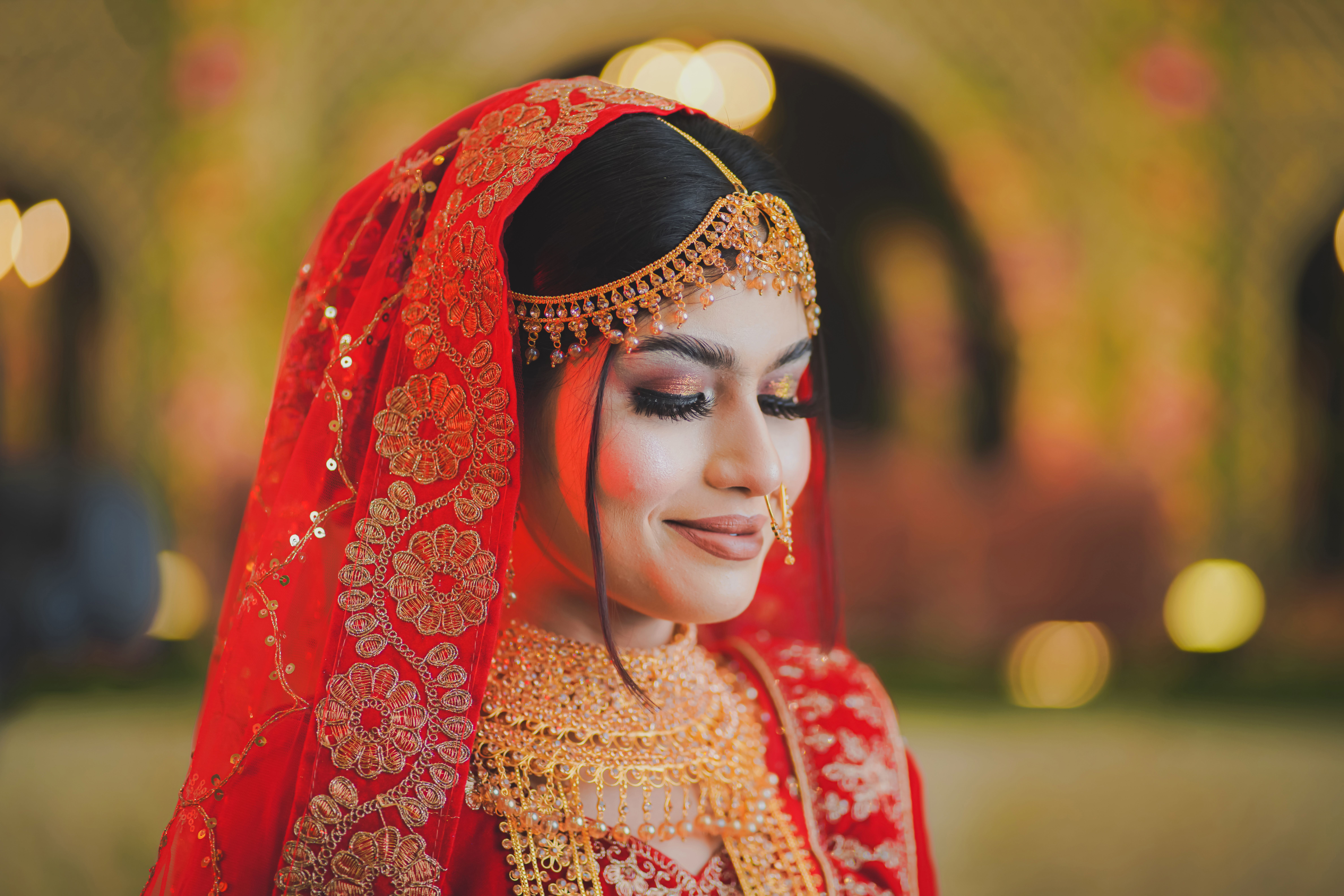 Bride Wearing a Red Ornate Veil · Free Stock Photo