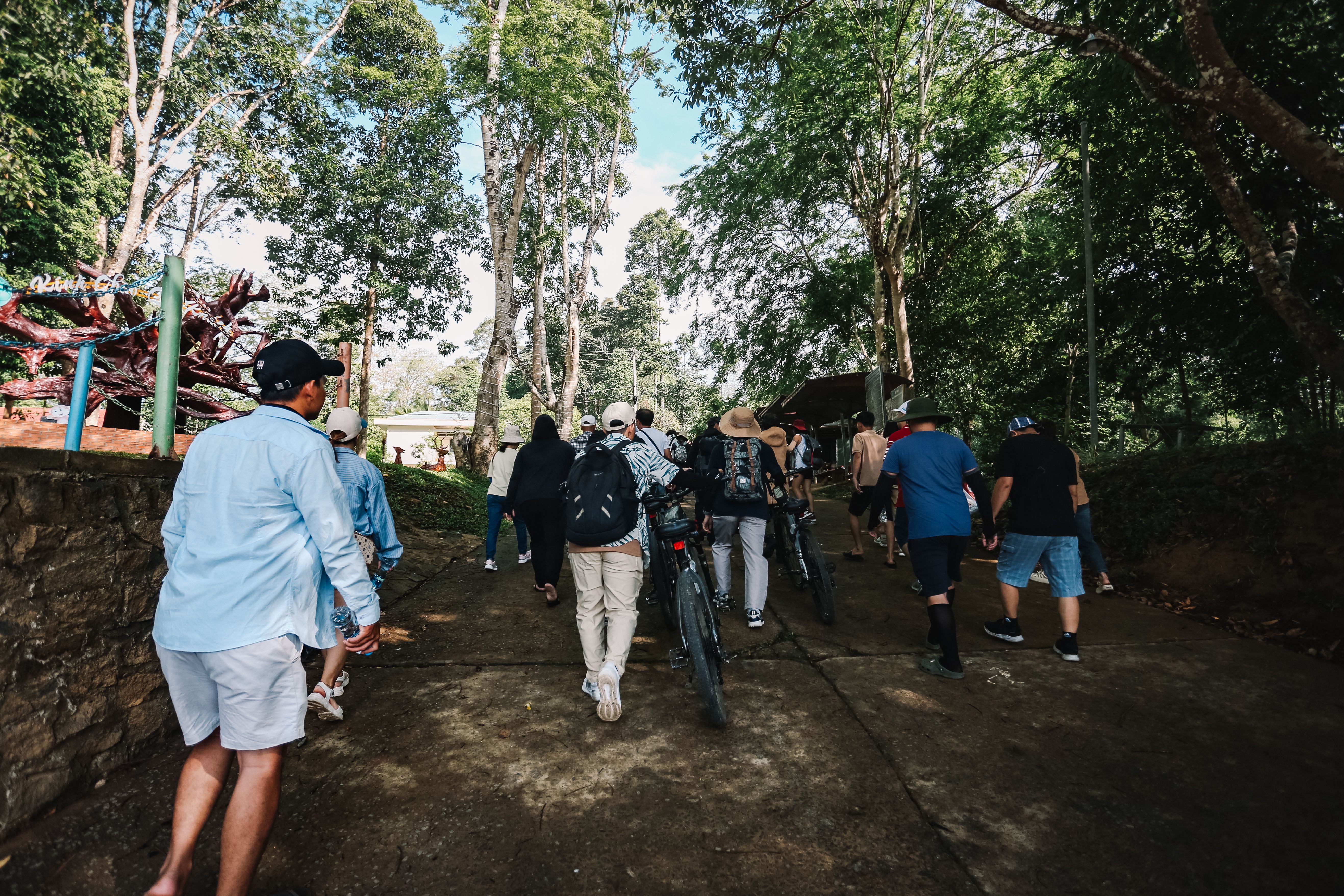 Group of Tourists Walking up the Hill · Free Stock Photo