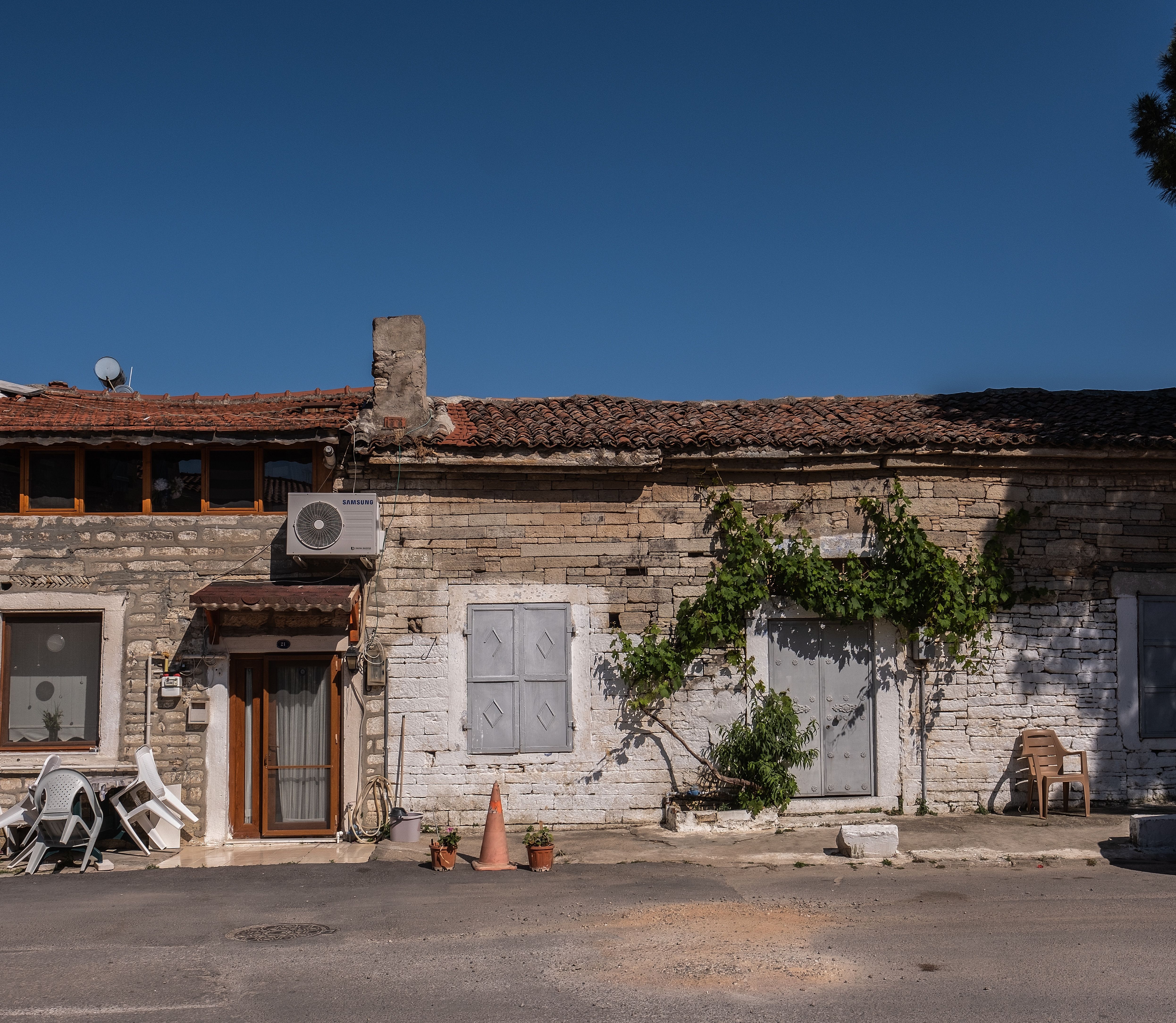 Facade of a Rural Building with Shutters and a Tiled Roof · Free Stock ...