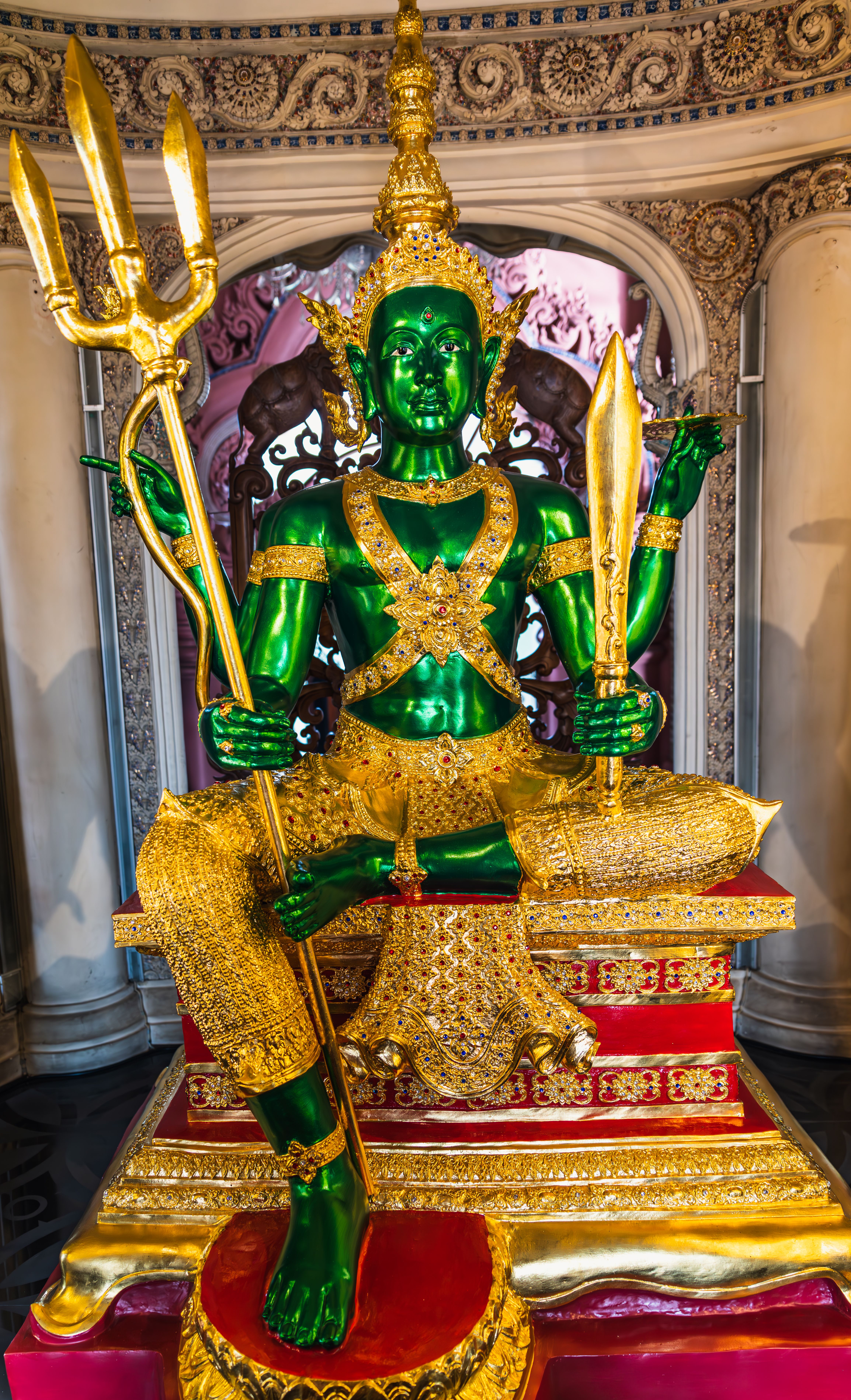 Statue of Indra Holding a Sword and a Trident · Free Stock Photo