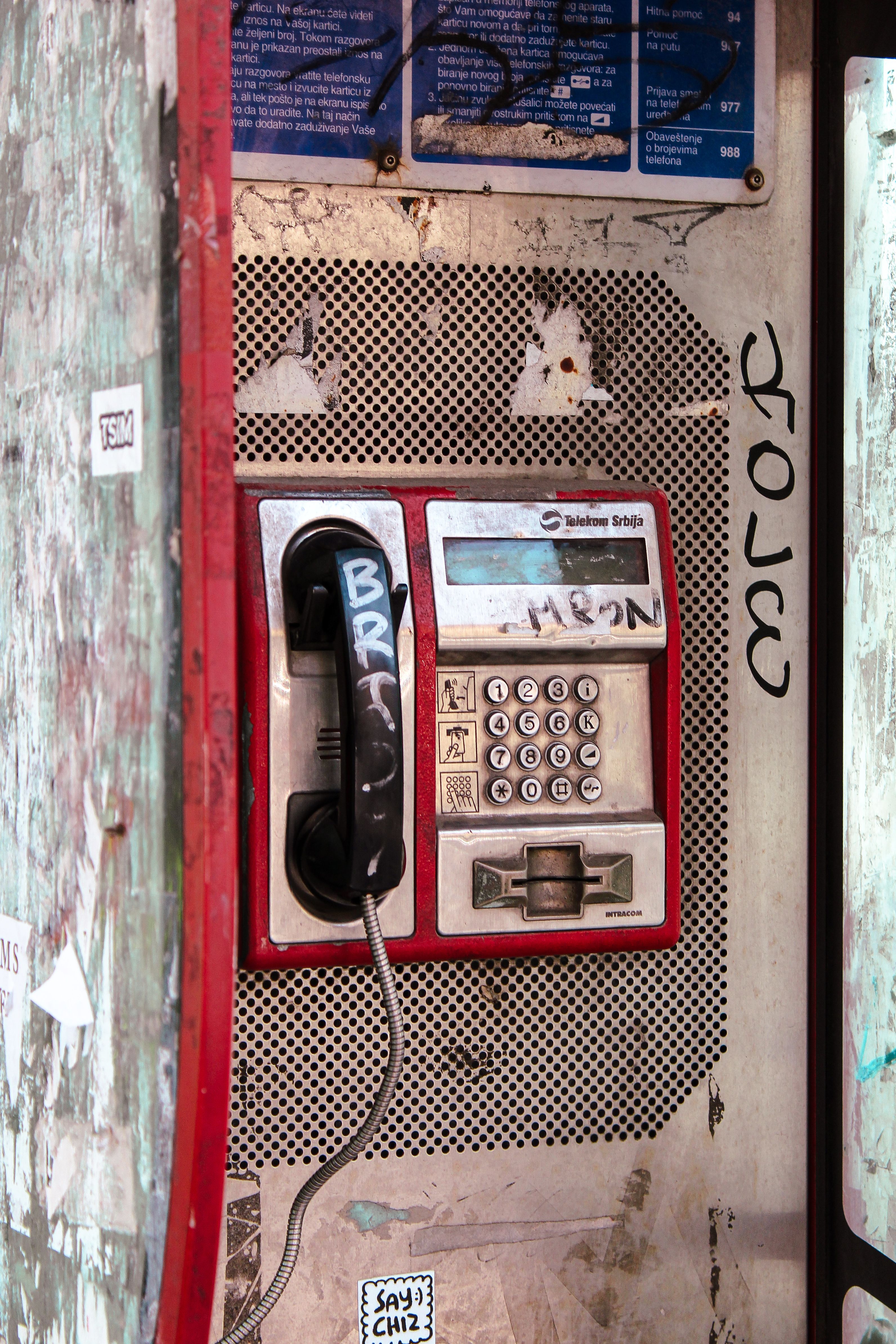 A telephone booth with graffiti on it · Free Stock Photo