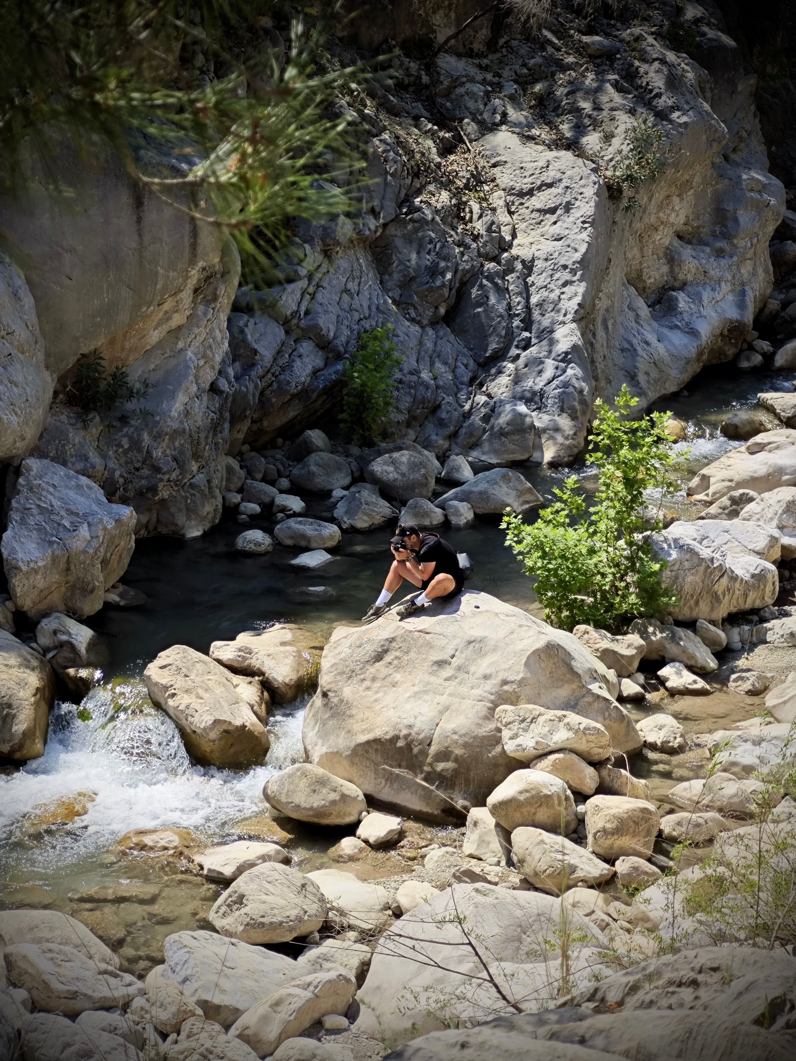Man on Rock Photographing River · Free Stock Photo
