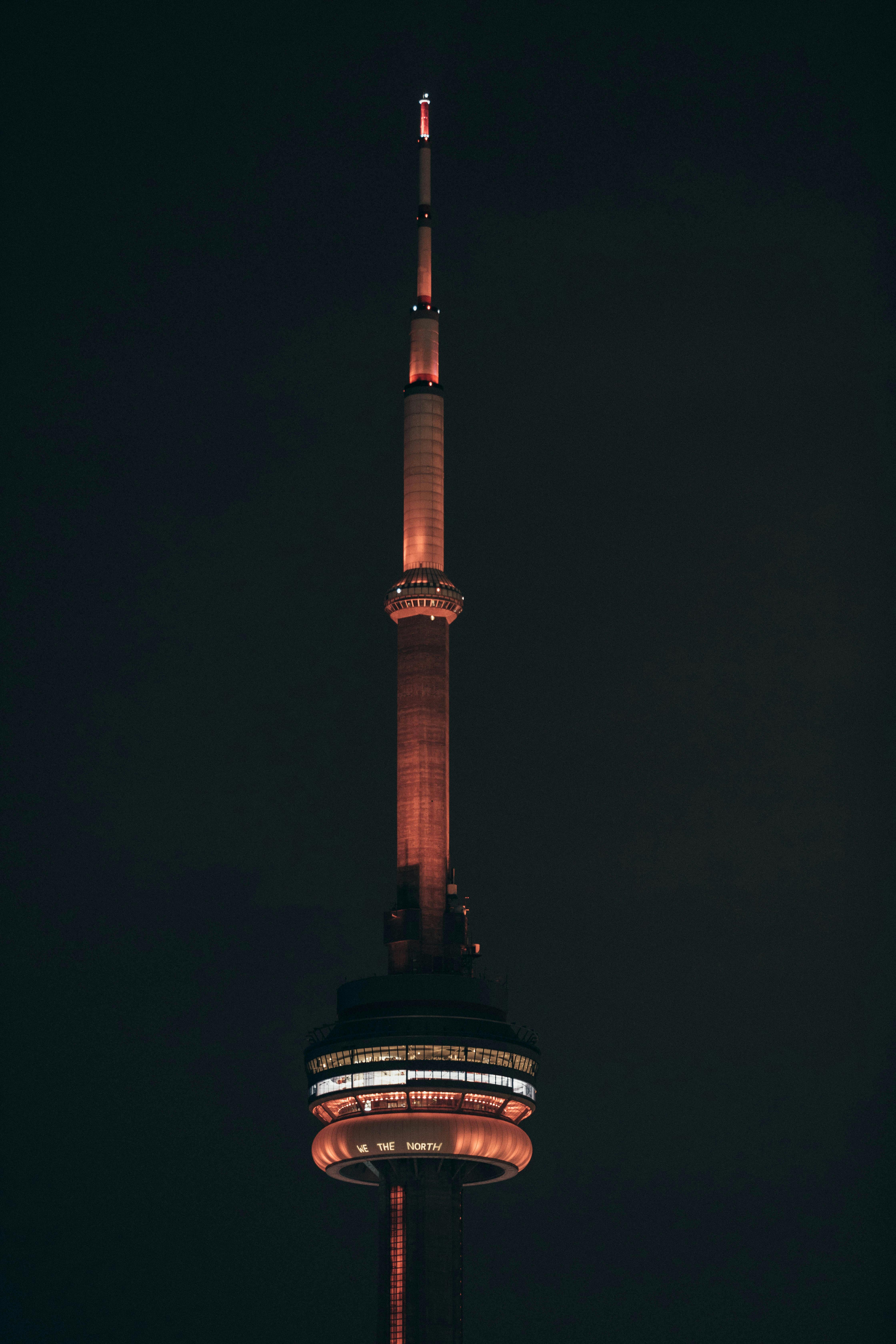Low-angle Photo of Lighted Tower during Night · Free Stock Photo