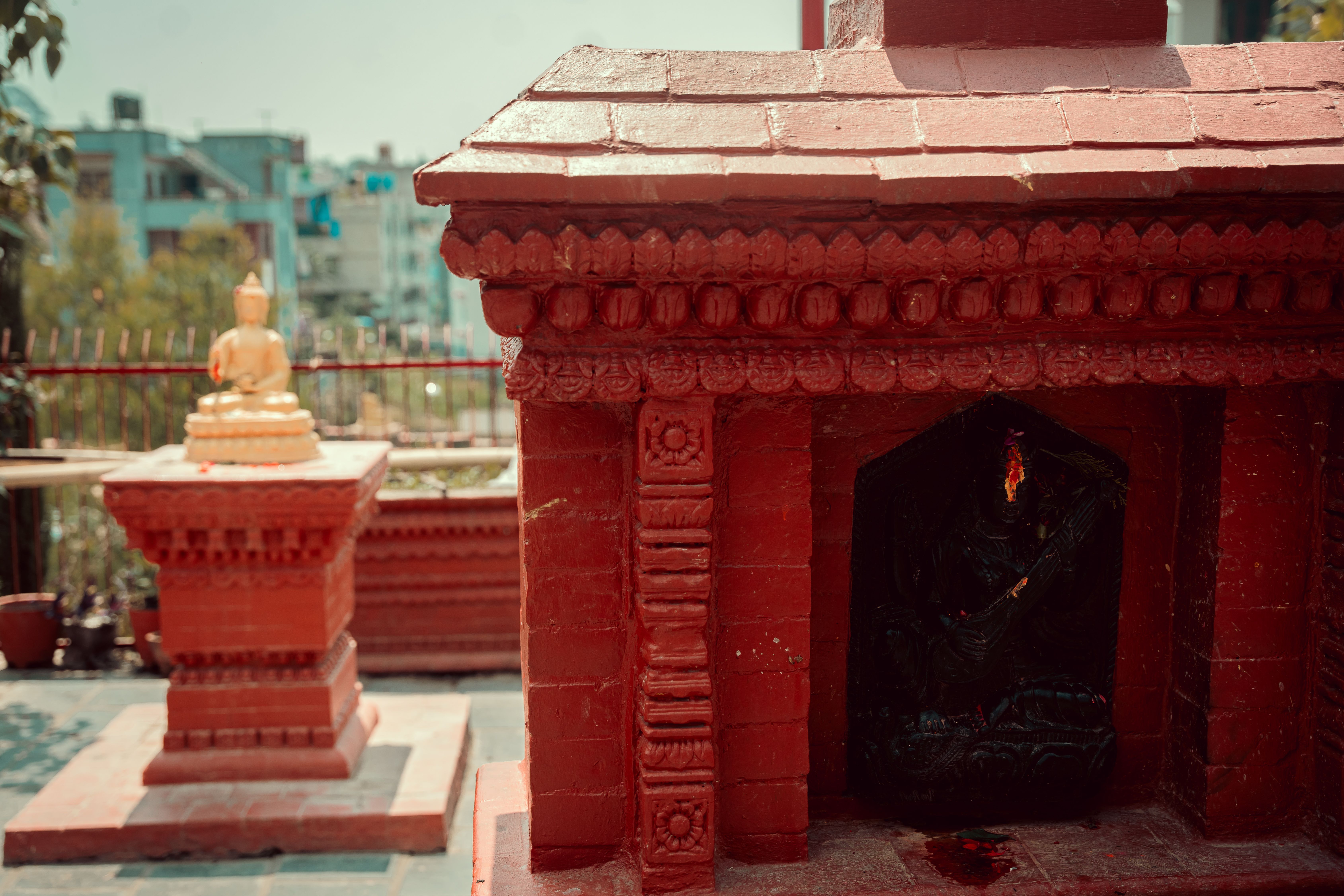 Buddha Statue in a Red Brick Shrine · Free Stock Photo