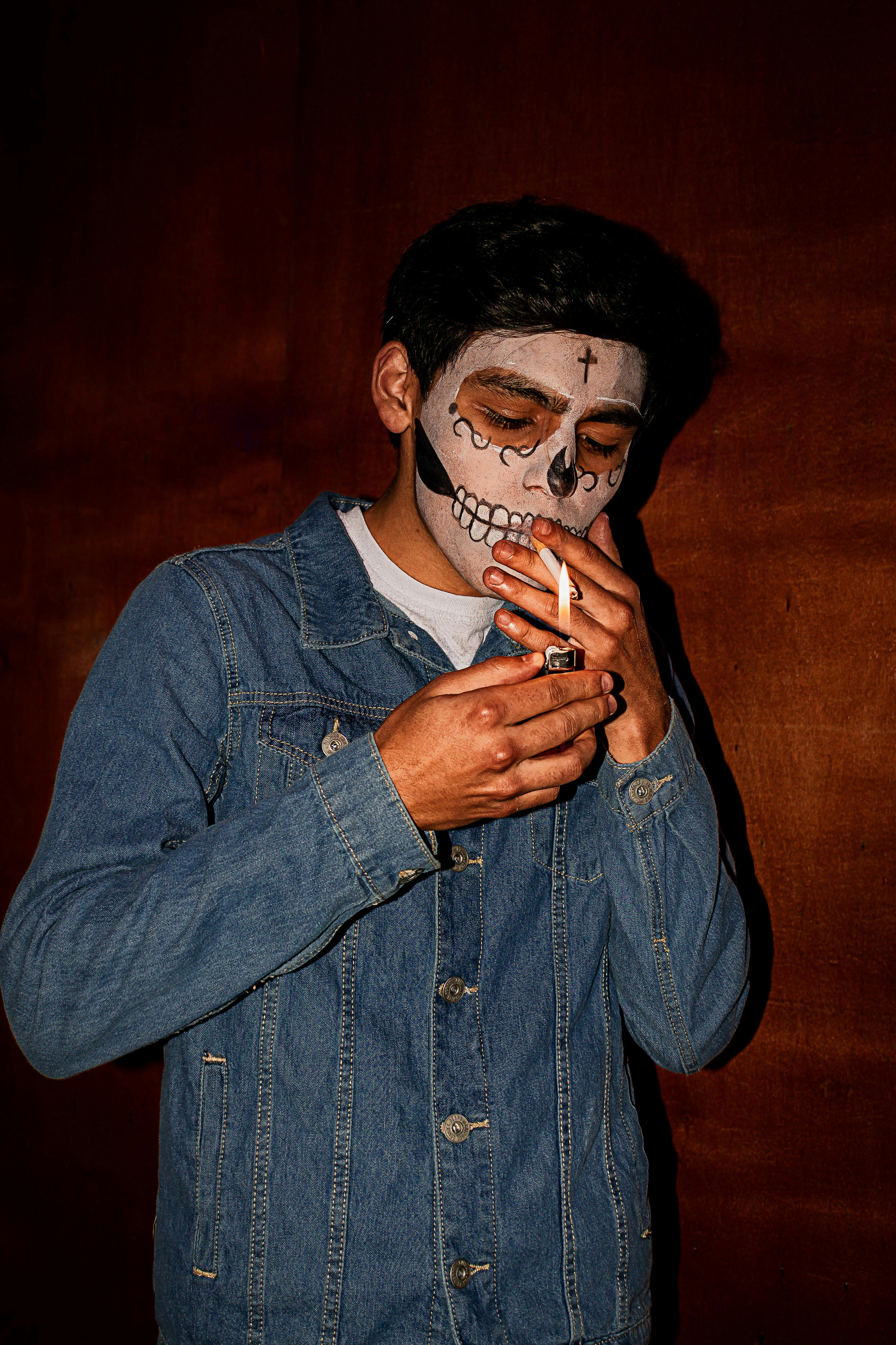 Man with Catrin Makeup Smoking Cigarette · Free Stock Photo