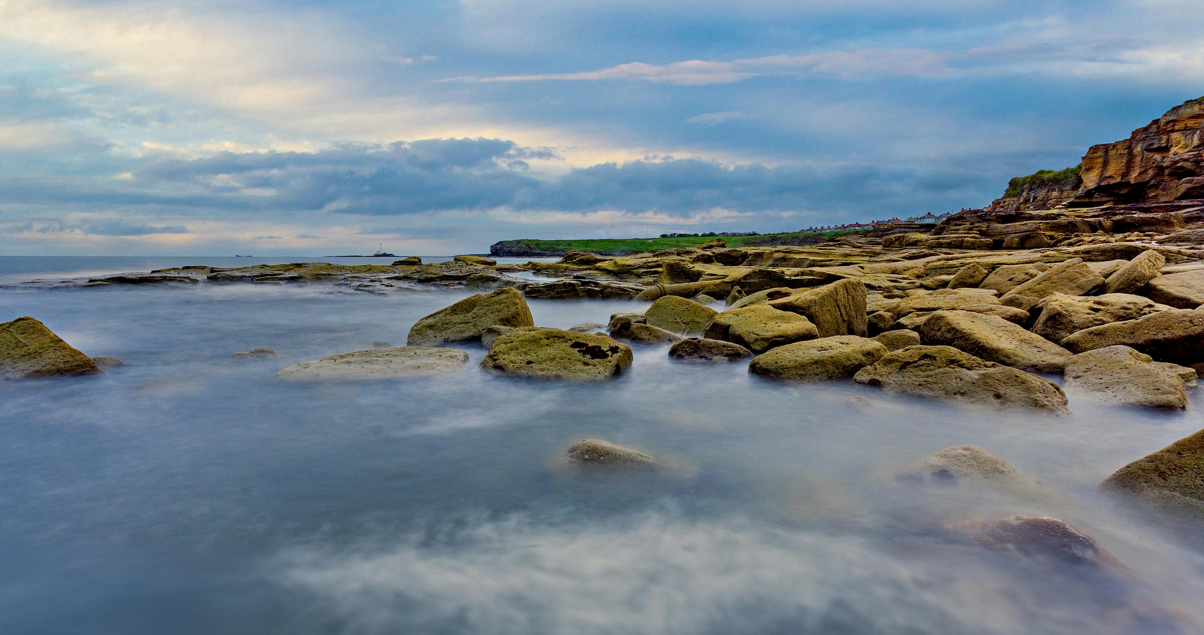 Rocks on Ocean Shore at Dawn · Free Stock Photo