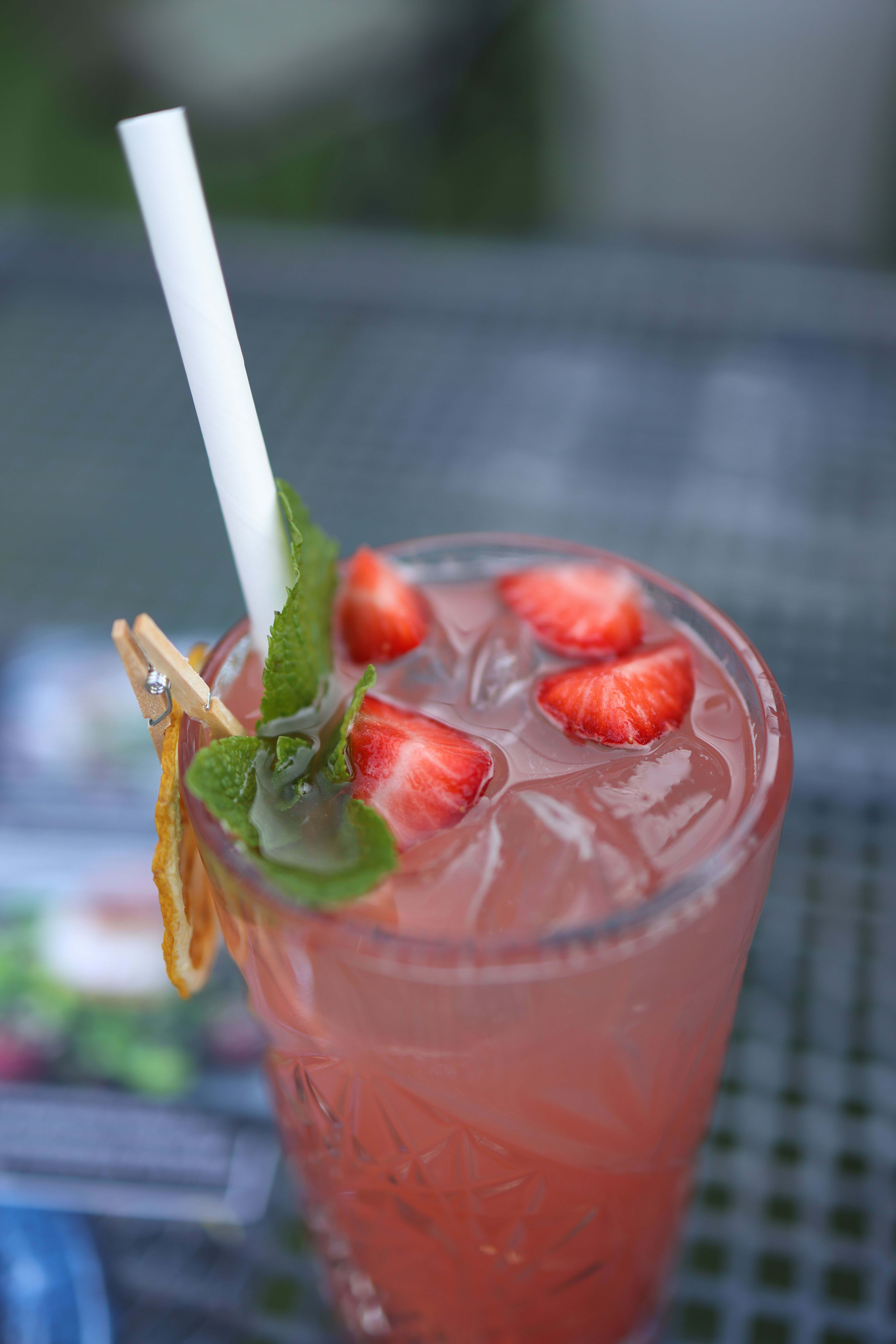 A strawberry drink with mint leaves and a straw · Free Stock Photo