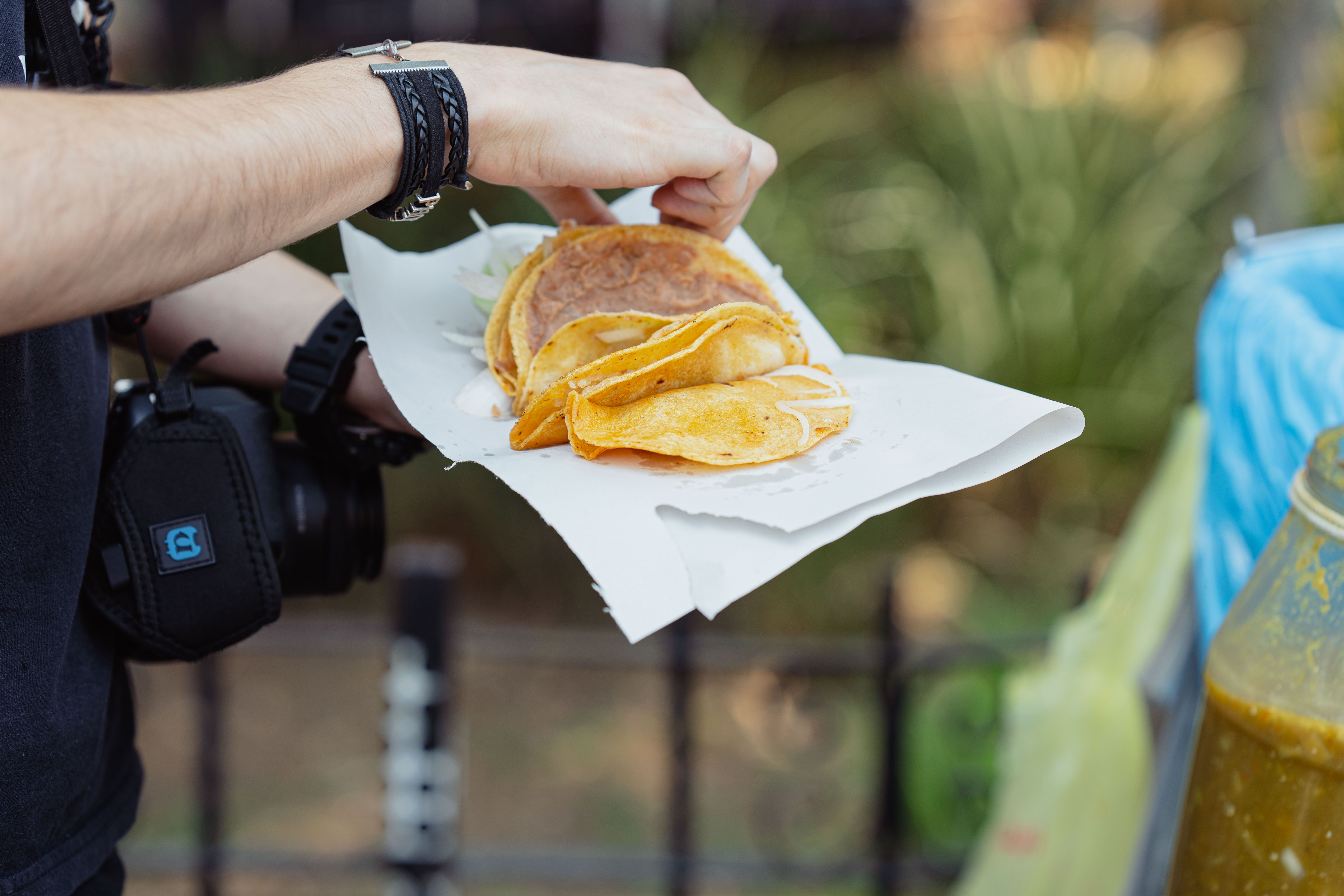Close-up of a Man Holding Food · Free Stock Photo