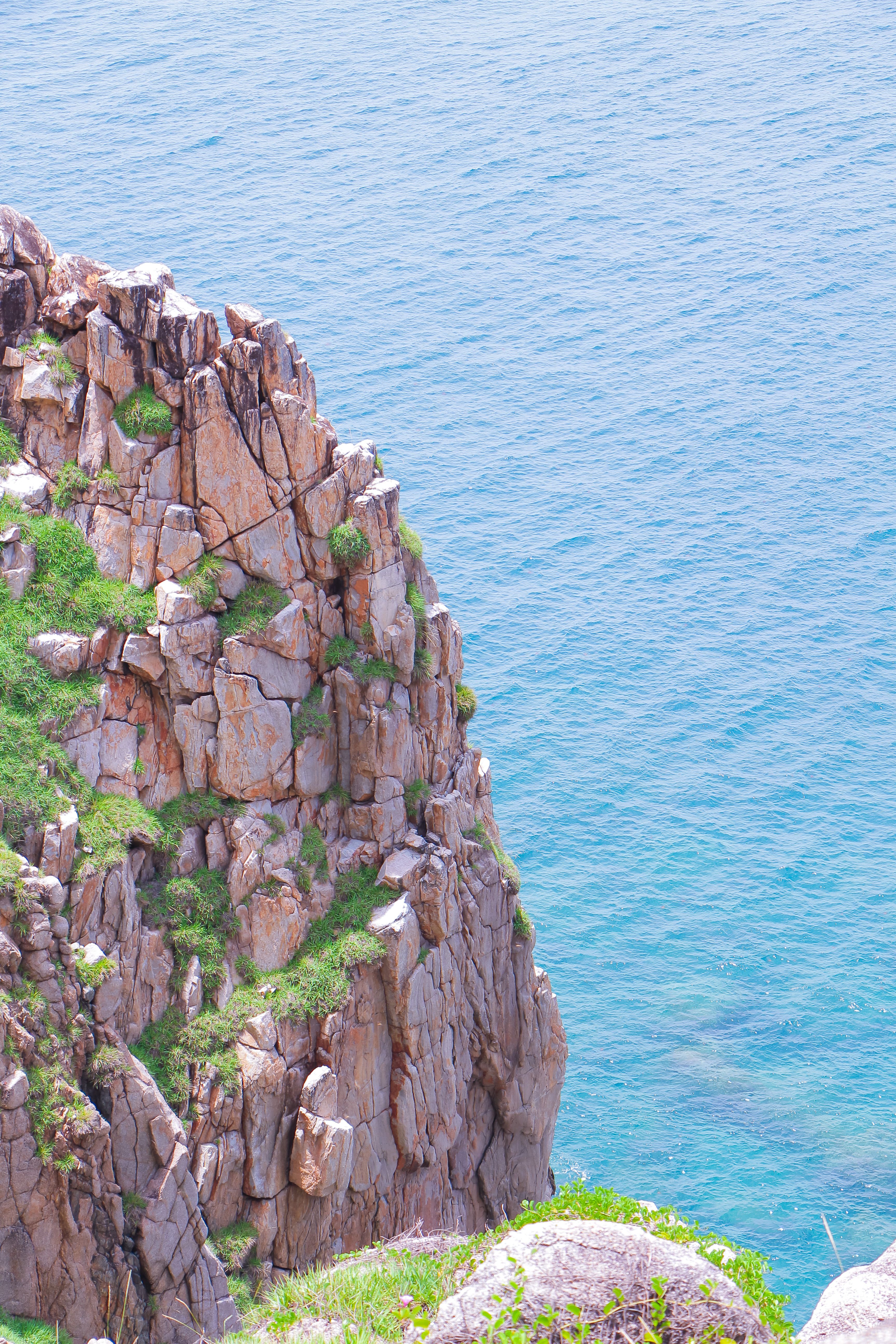 Rocks on Cliff on Seashore · Free Stock Photo