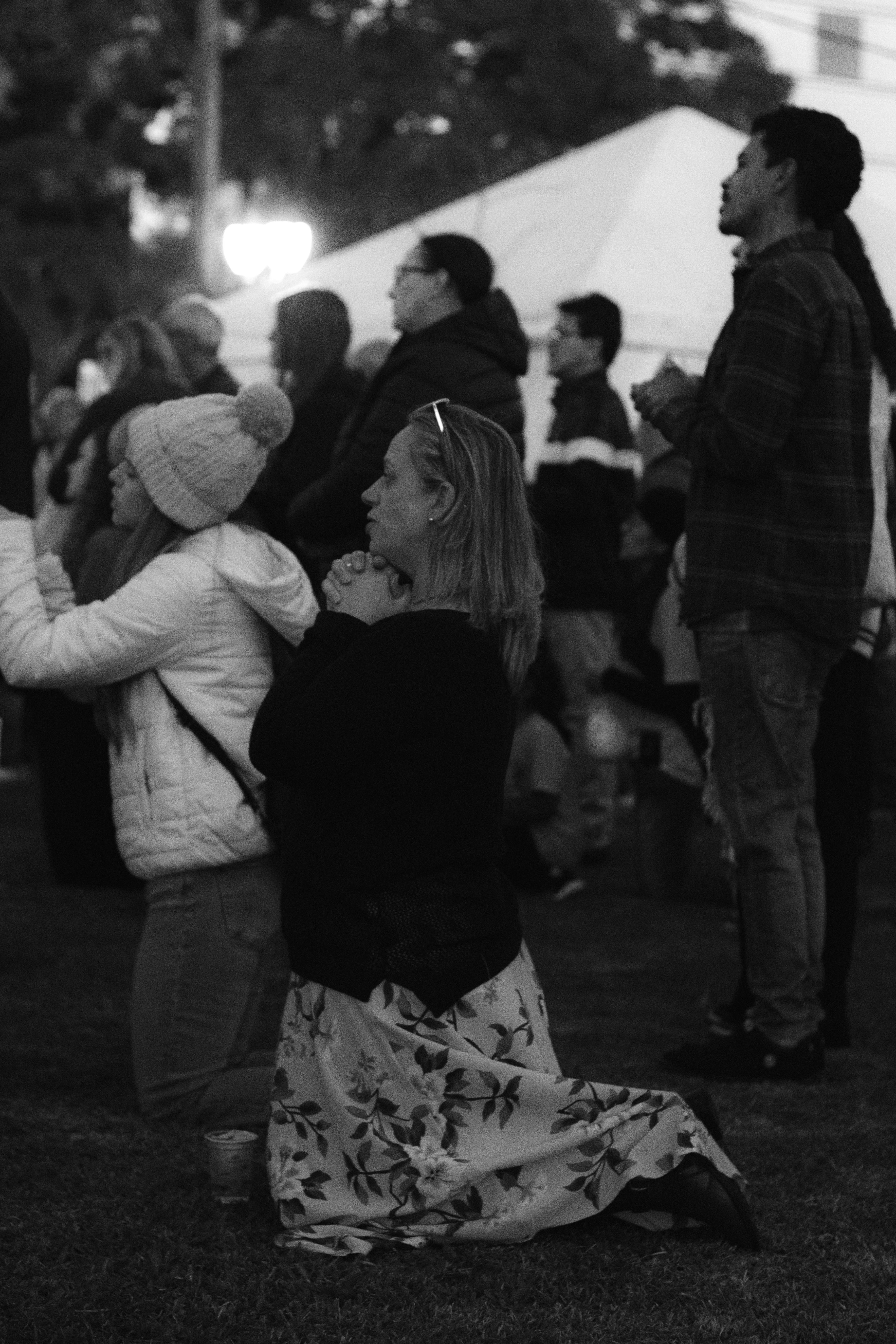 People Kneeling and Praying · Free Stock Photo