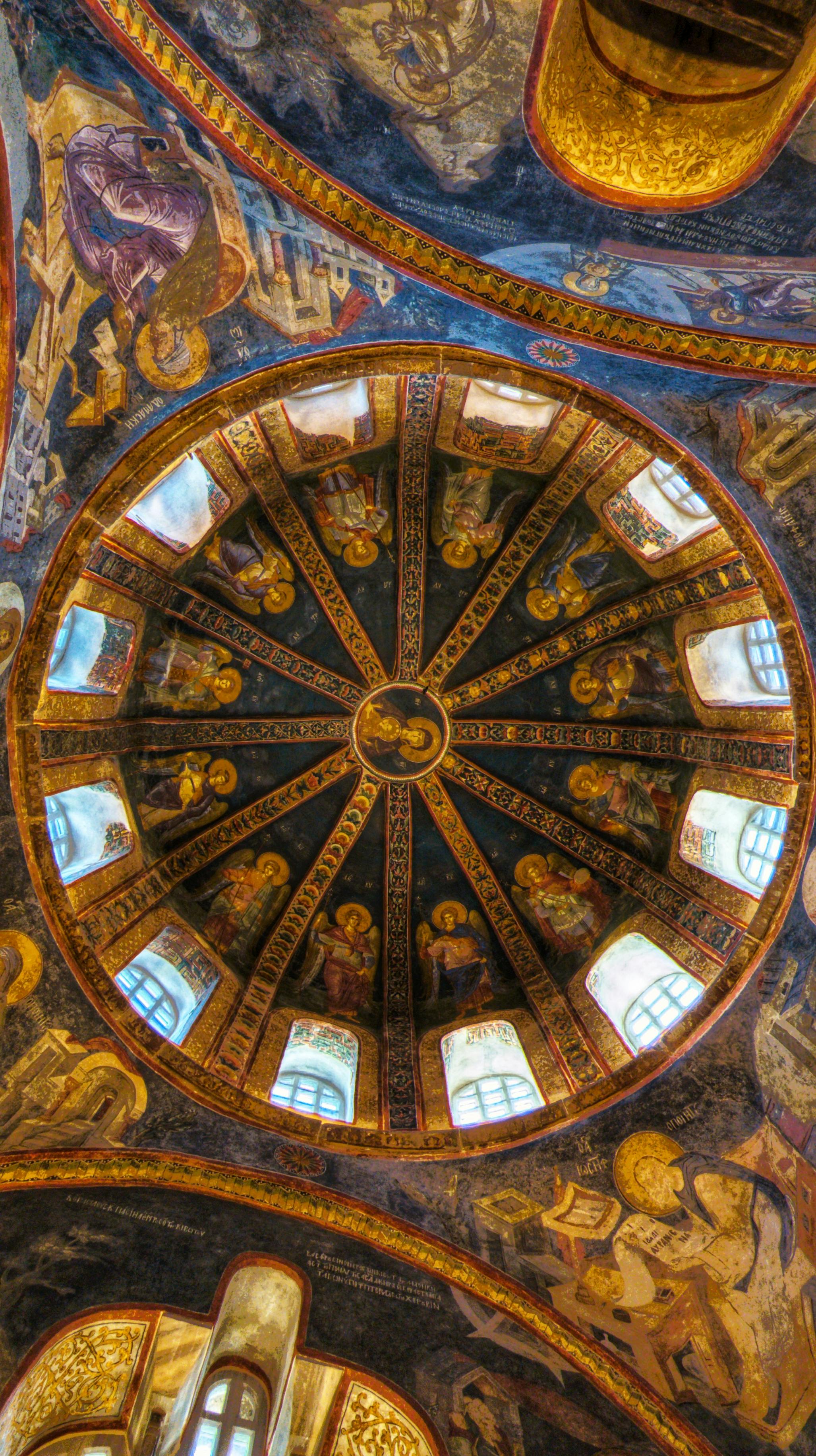 Ornamental ceiling in medieval church with chandelier and fresco ...