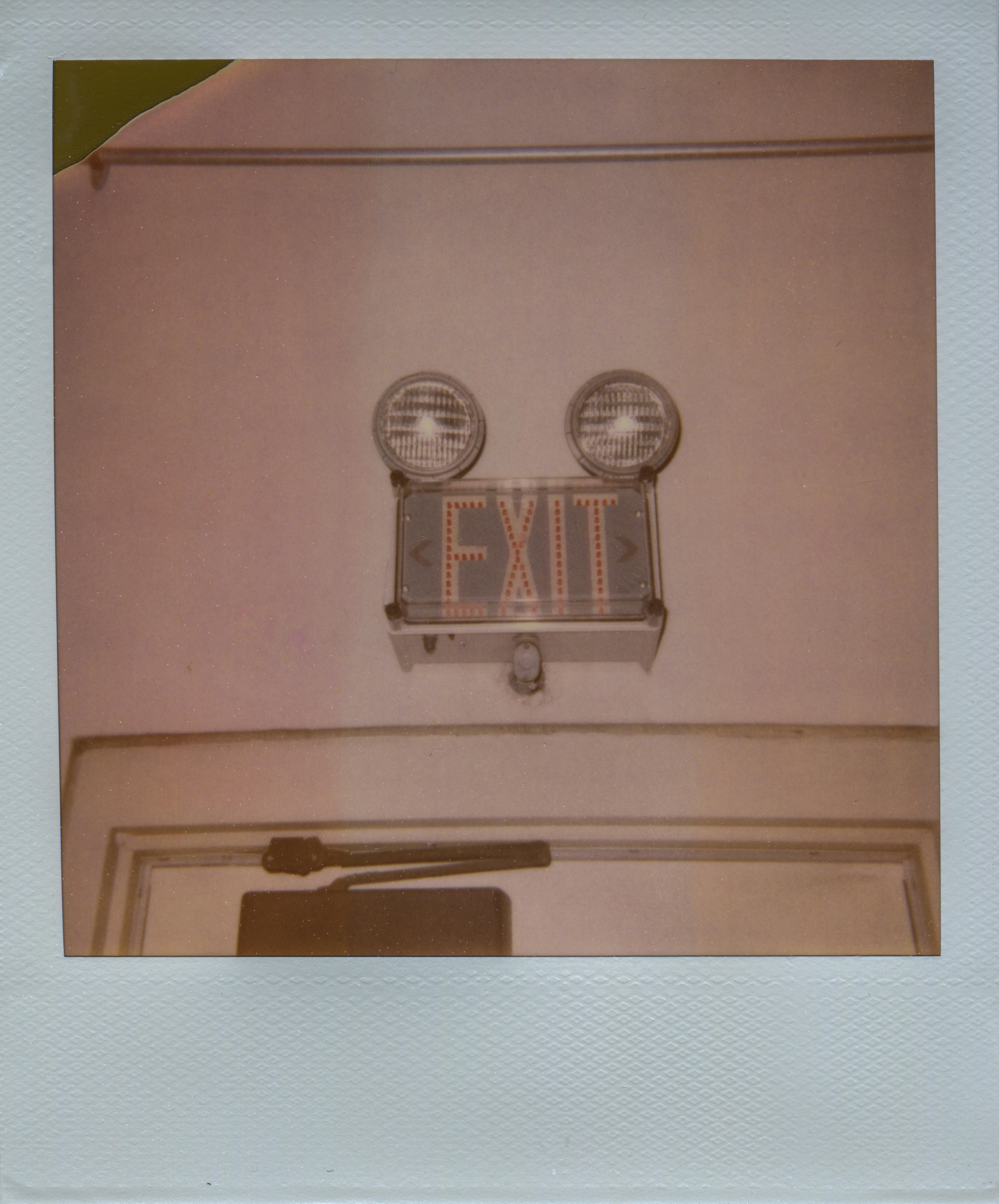 Exit Sign With Emergency Lights Close-up Photography · Free Stock Photo