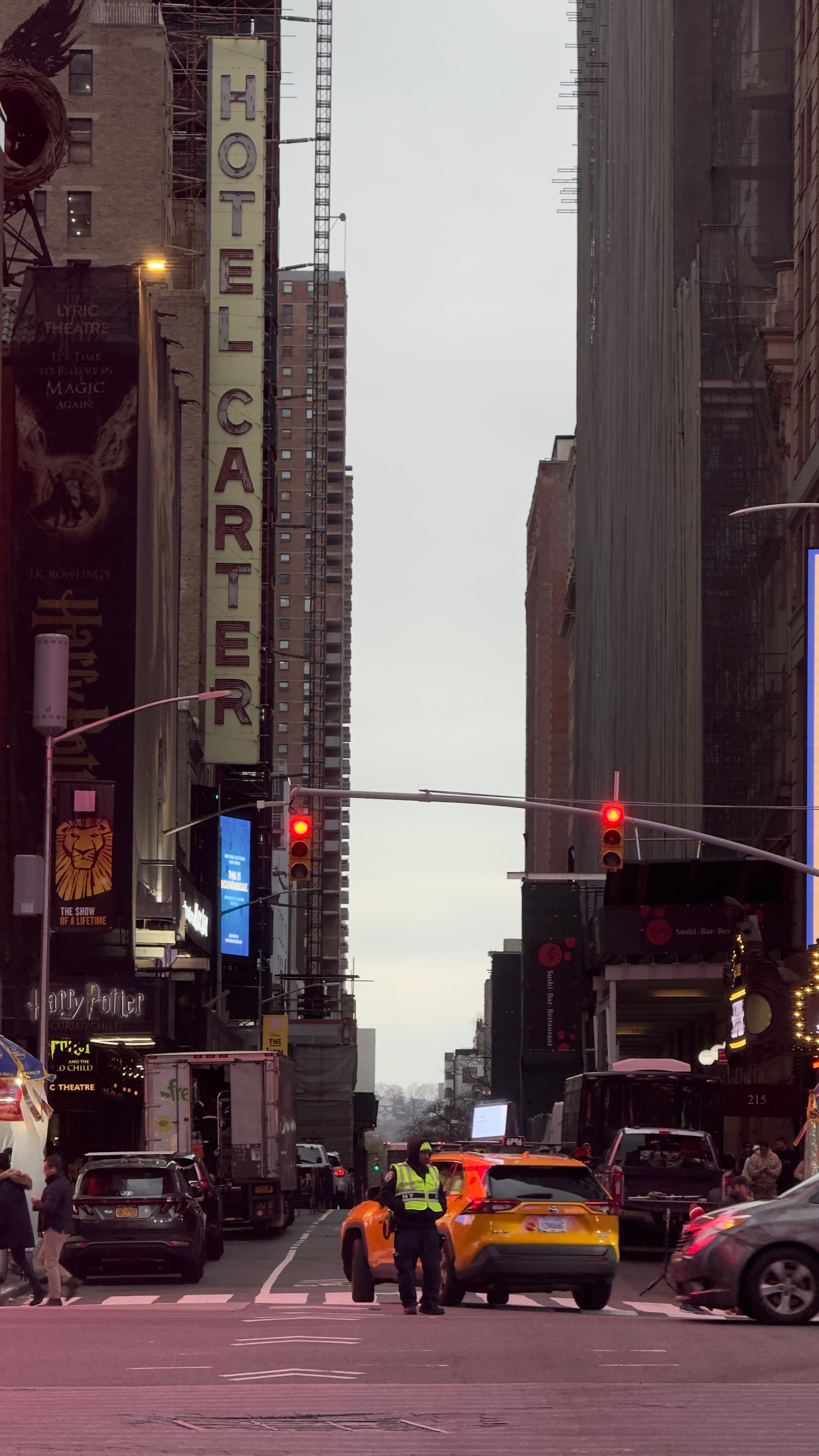 Free Vibrant street scene in NYC featuring Hotel Carter and a classic ...