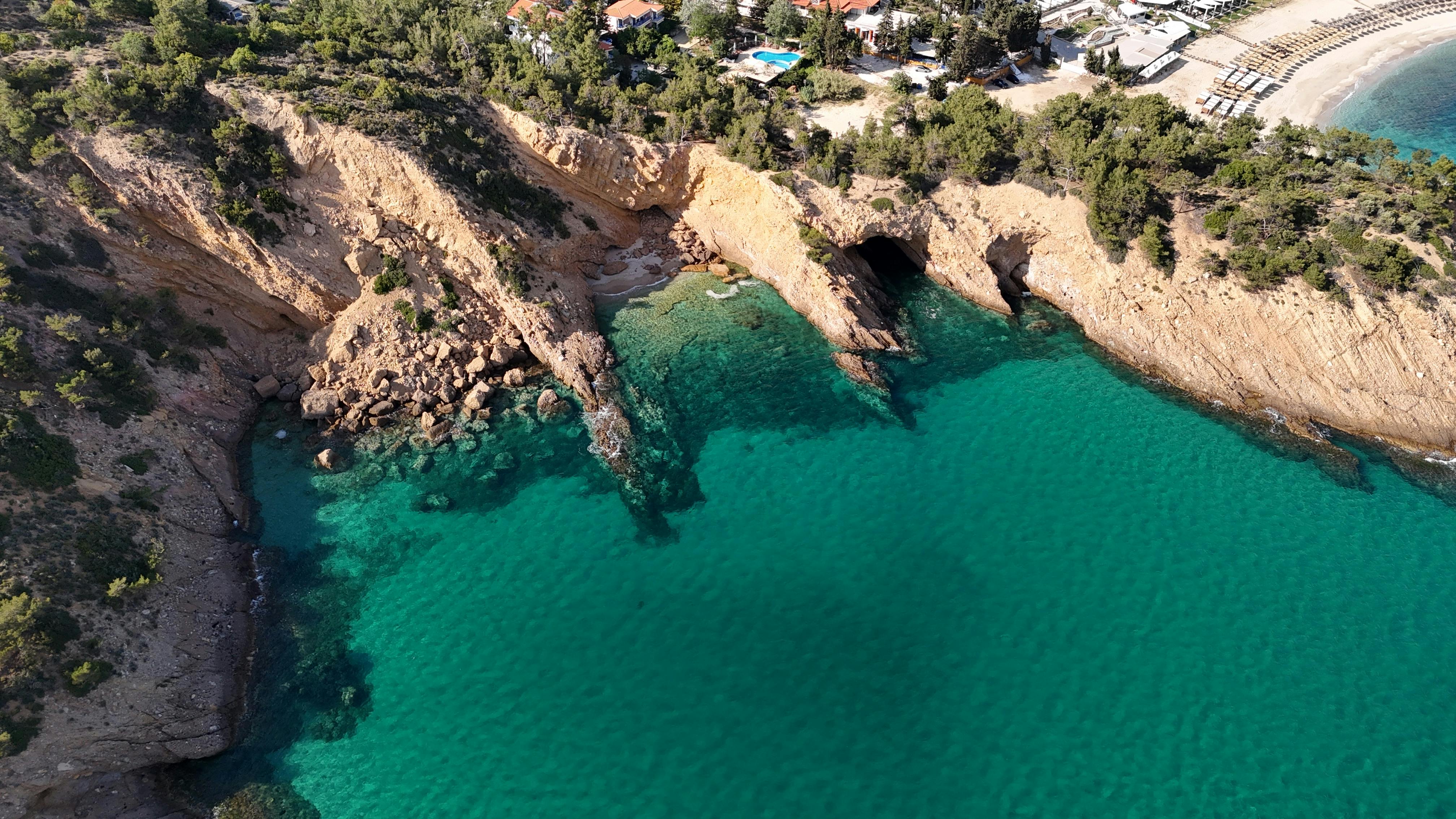 Sand Cliffs on Ocean Shore · Free Stock Photo