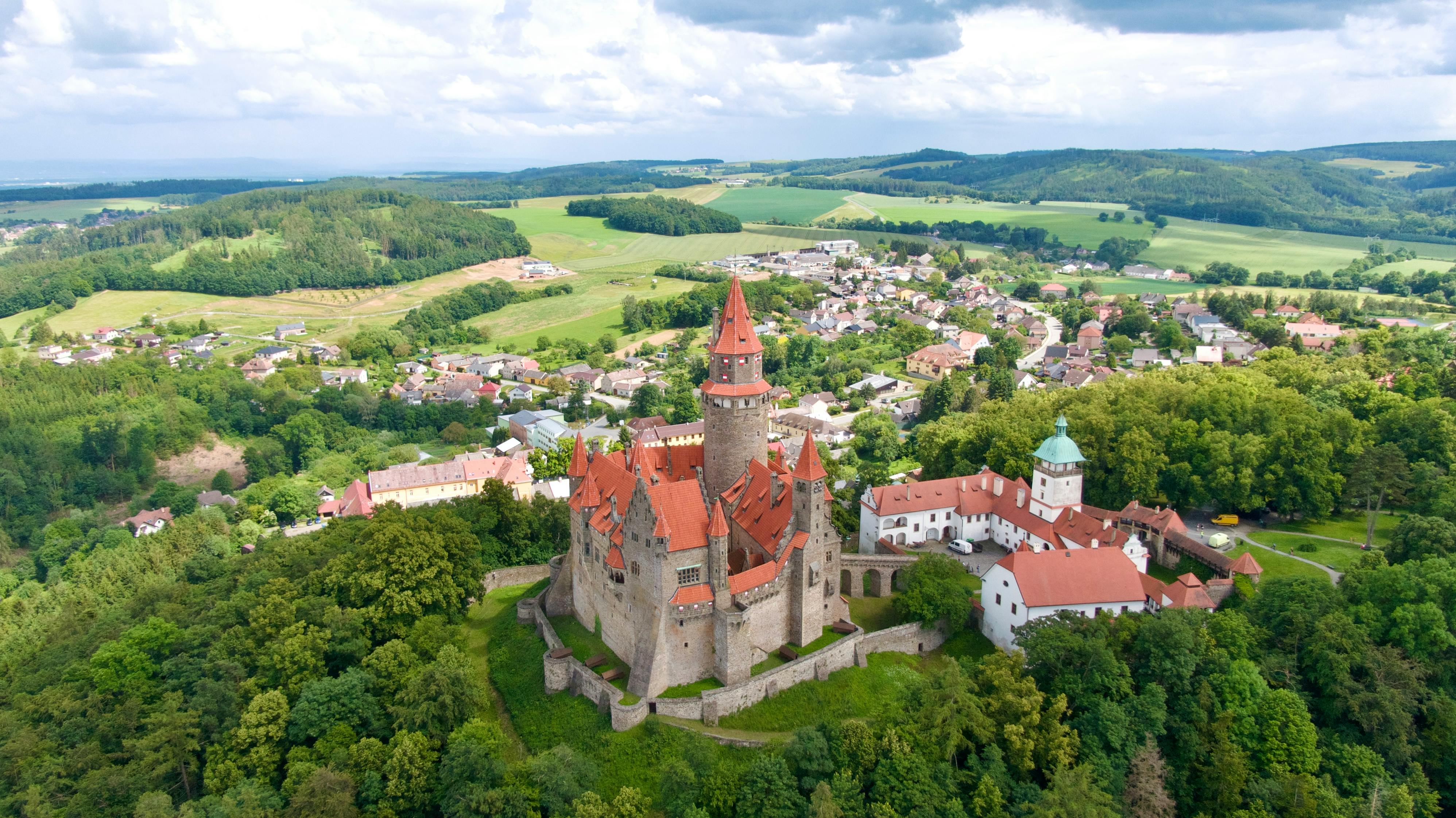 Aerial View of the Castle on a Hill Above the Village of Bouzov in the ...