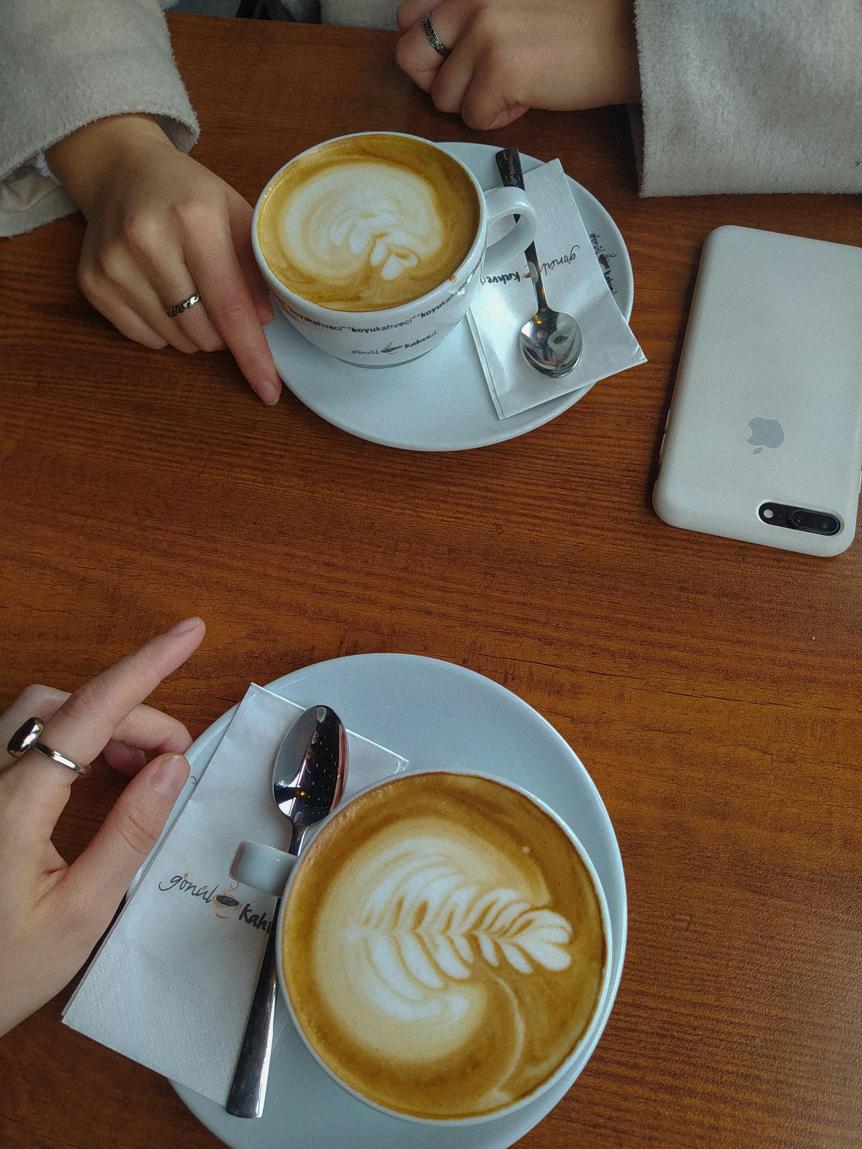 Two People Having Coffee Together · Free Stock Photo