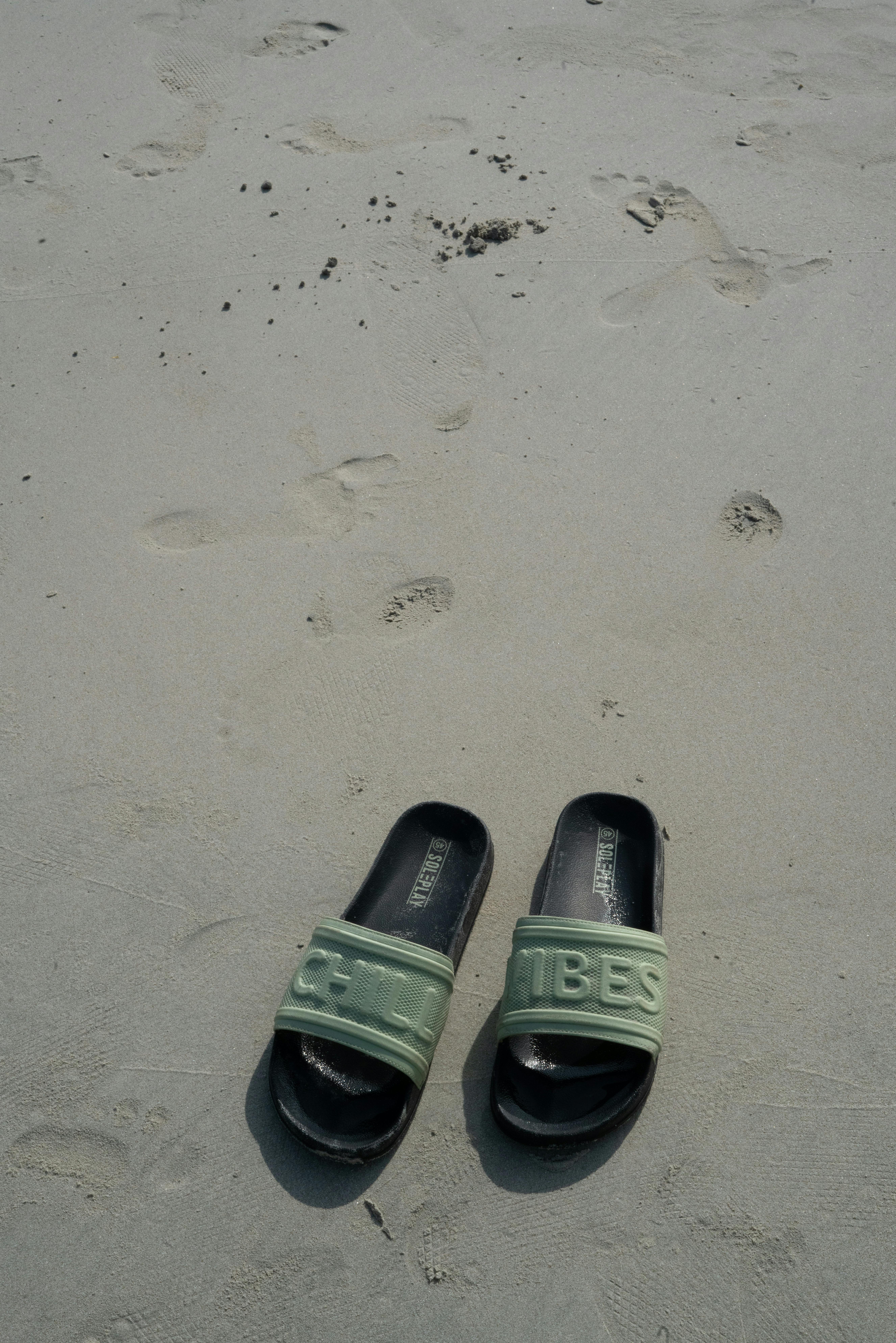 Pair Of Brown Flip-flops · Free Stock Photo