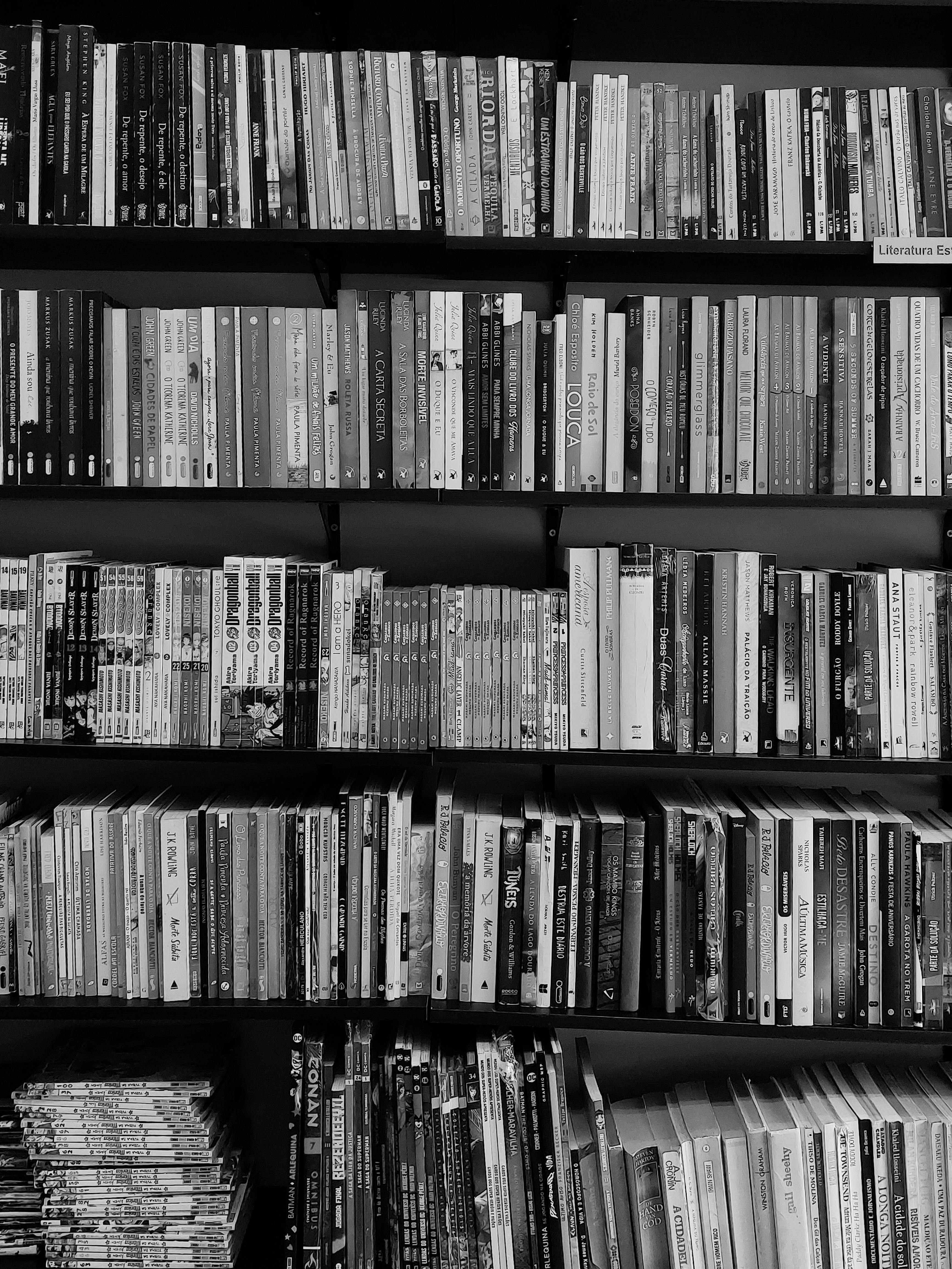 Black and White Photo of a Full Bookcase · Free Stock Photo