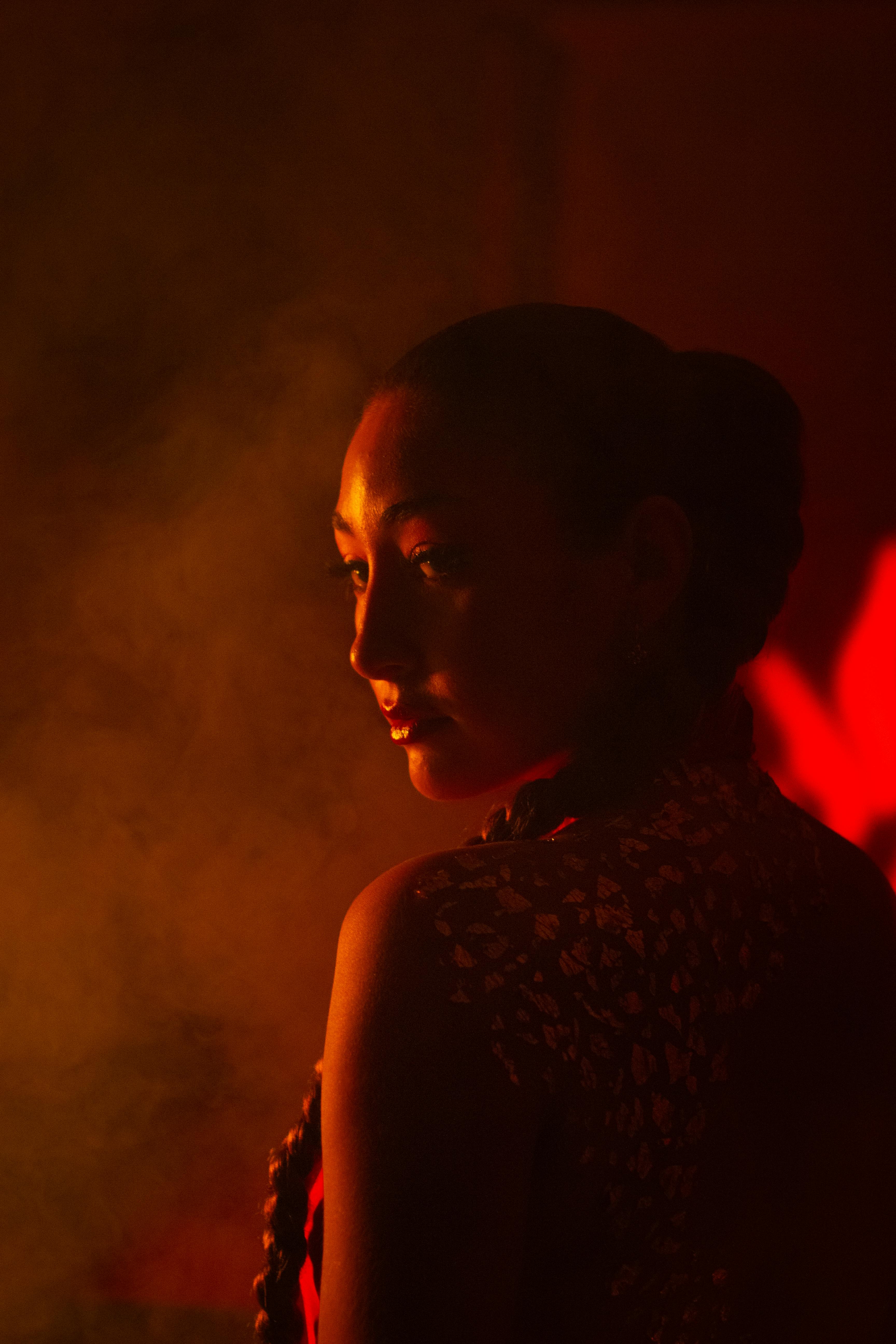 Portrait of Woman in Red Light · Free Stock Photo