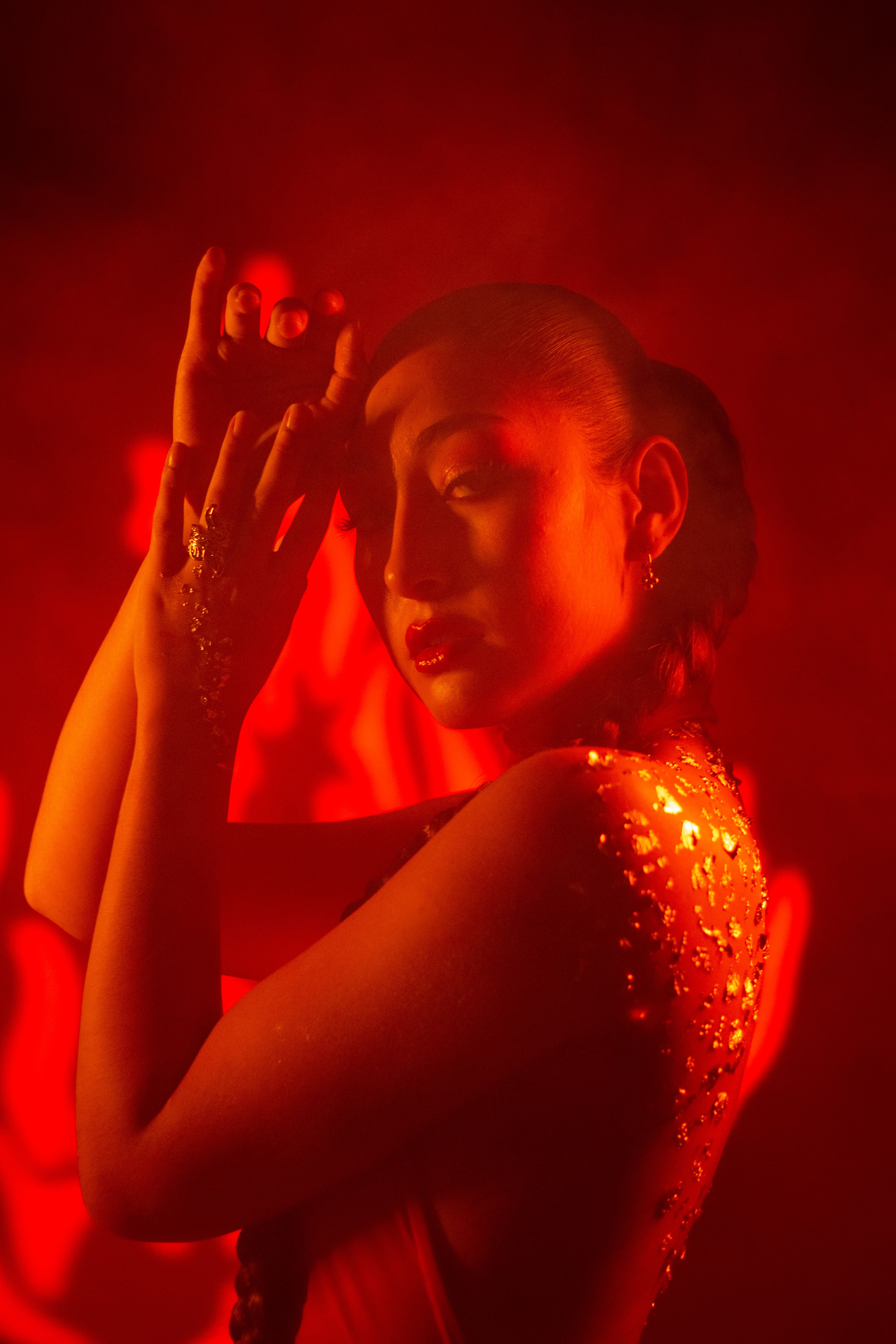 Portrait of Woman in Red Light · Free Stock Photo