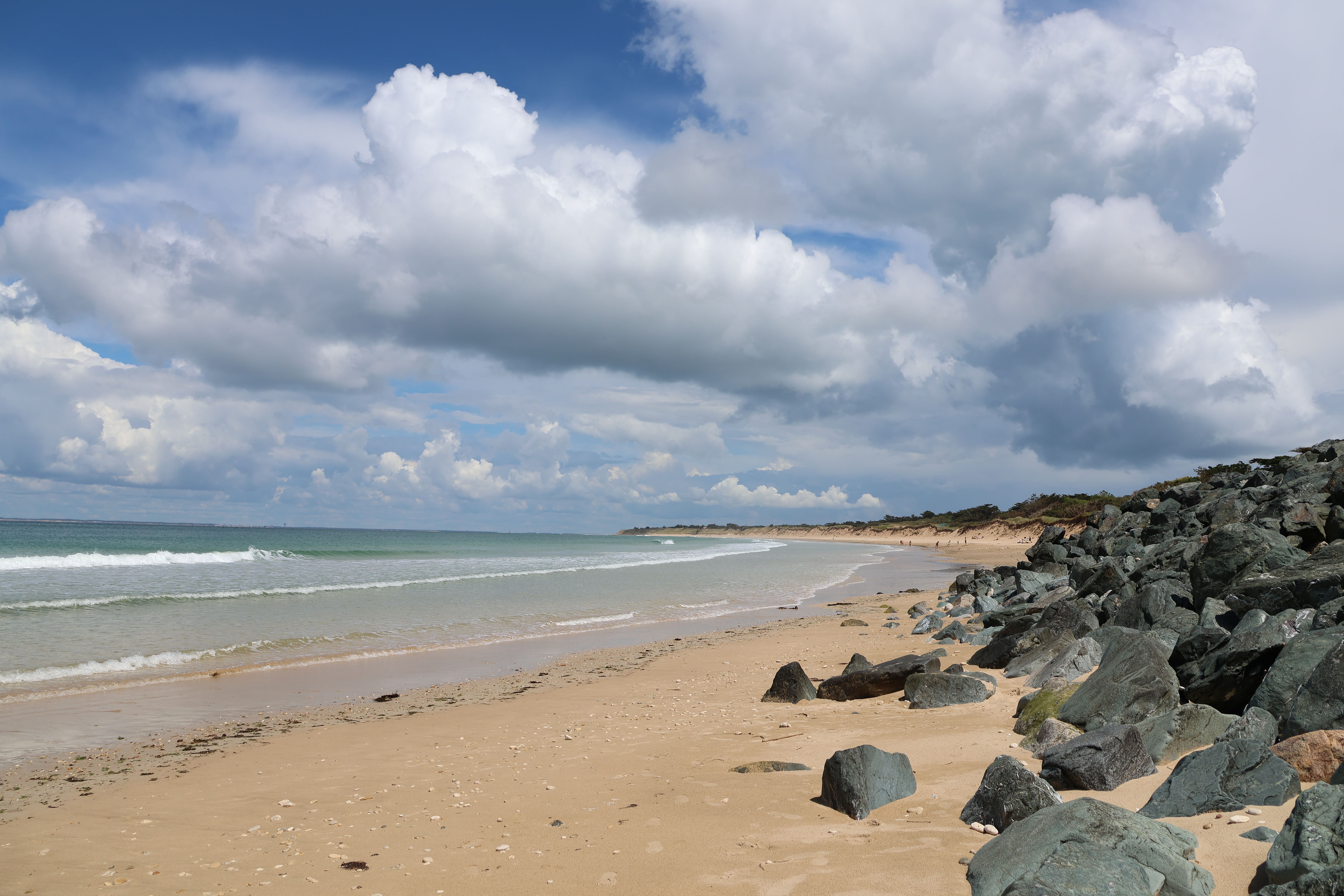 Rocks on a Sunny Beach · Free Stock Photo