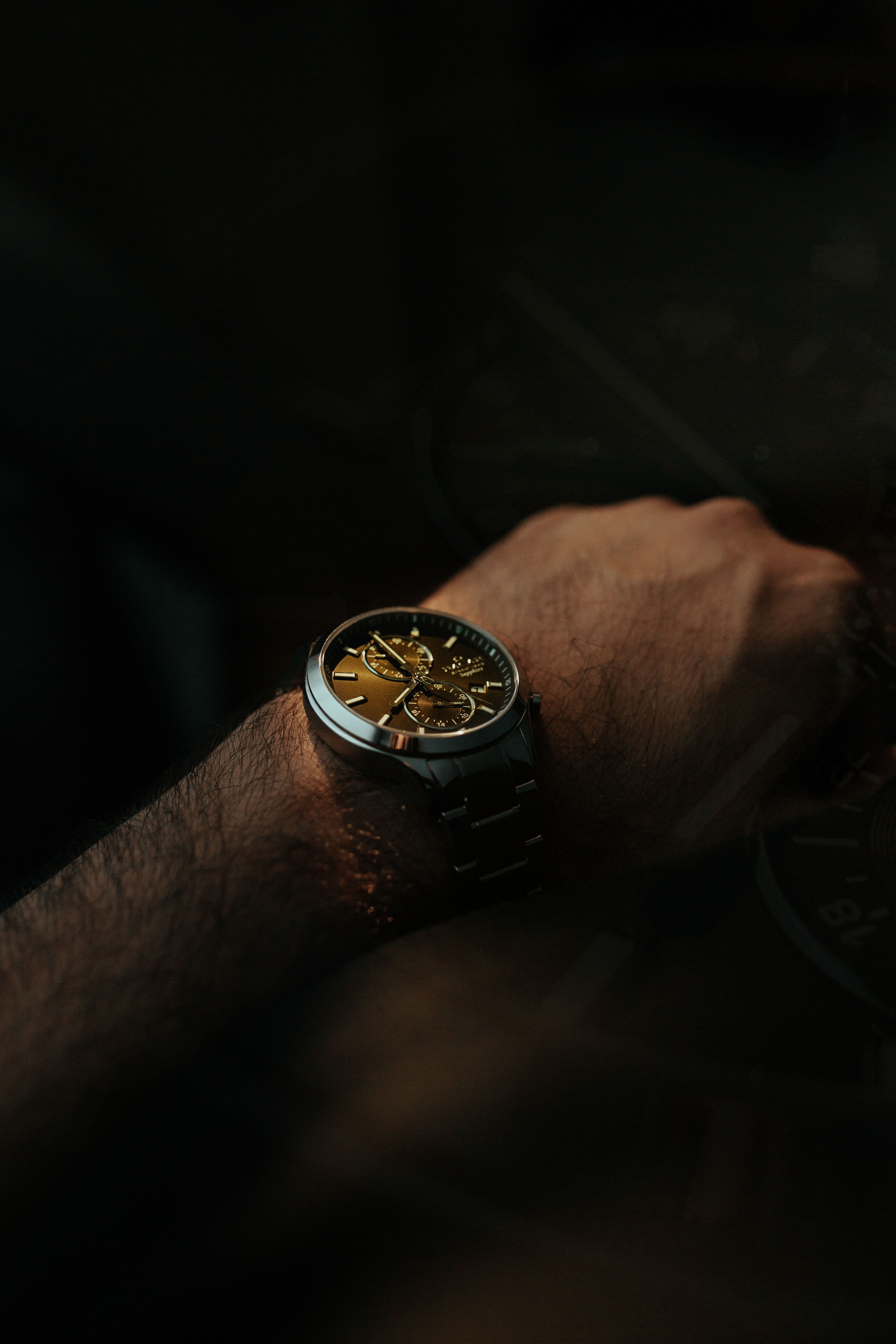 Bracelet Wristwatch on a Mans Hand · Free Stock Photo