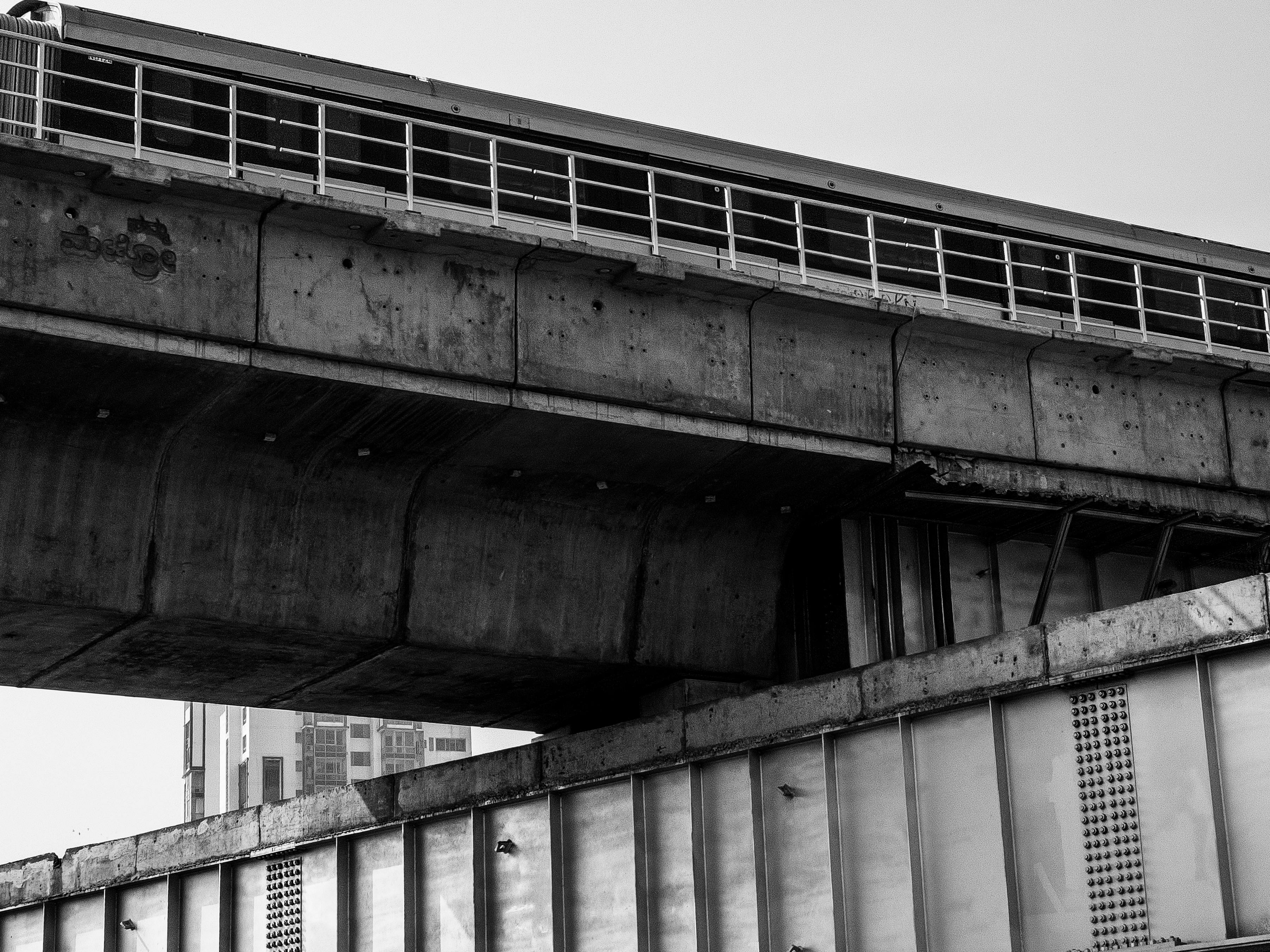 Black and White Photo of a Concrete Bridge in a City · Free Stock Photo