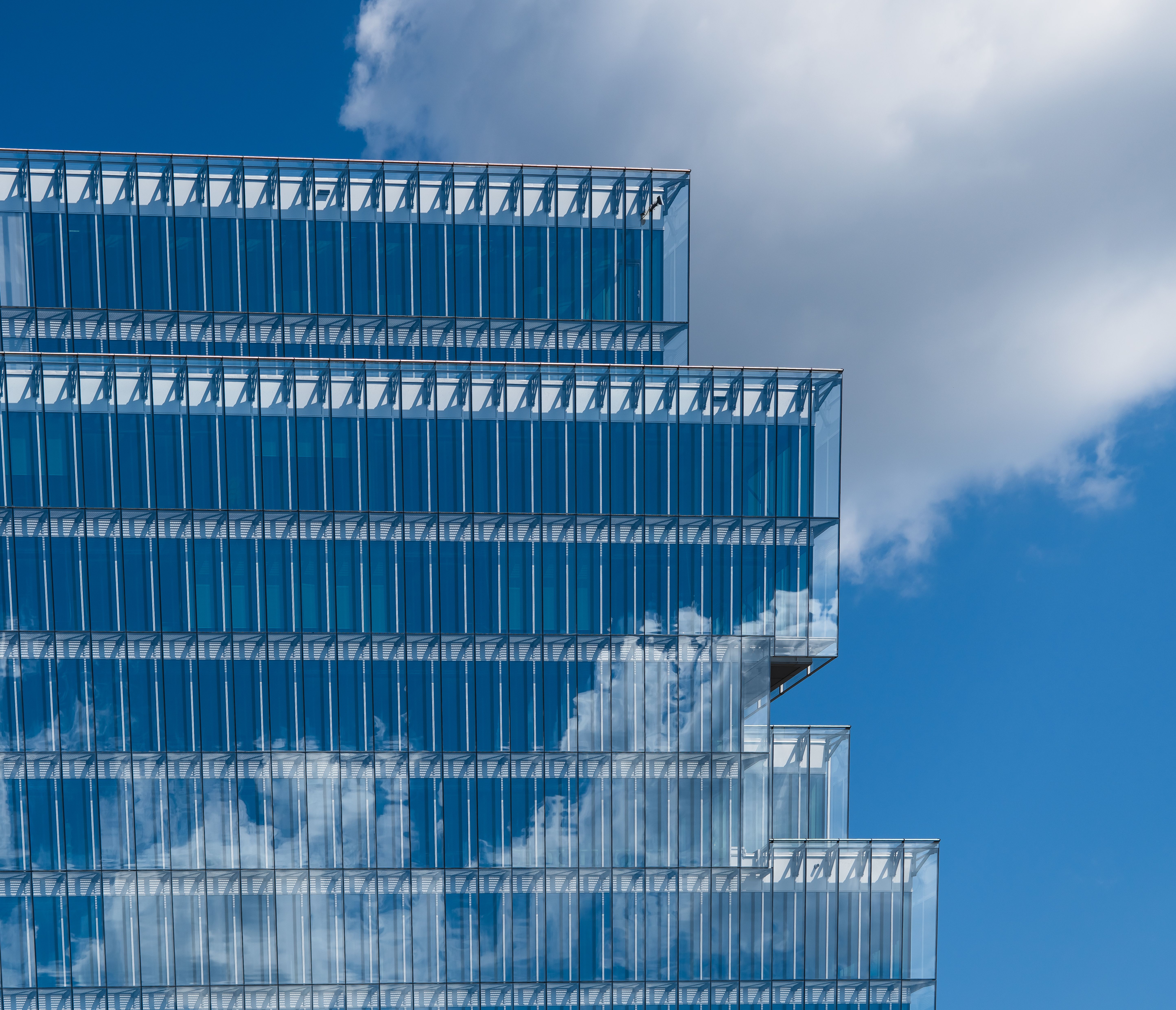 Reflection of the Sky on a Glass Building · Free Stock Photo