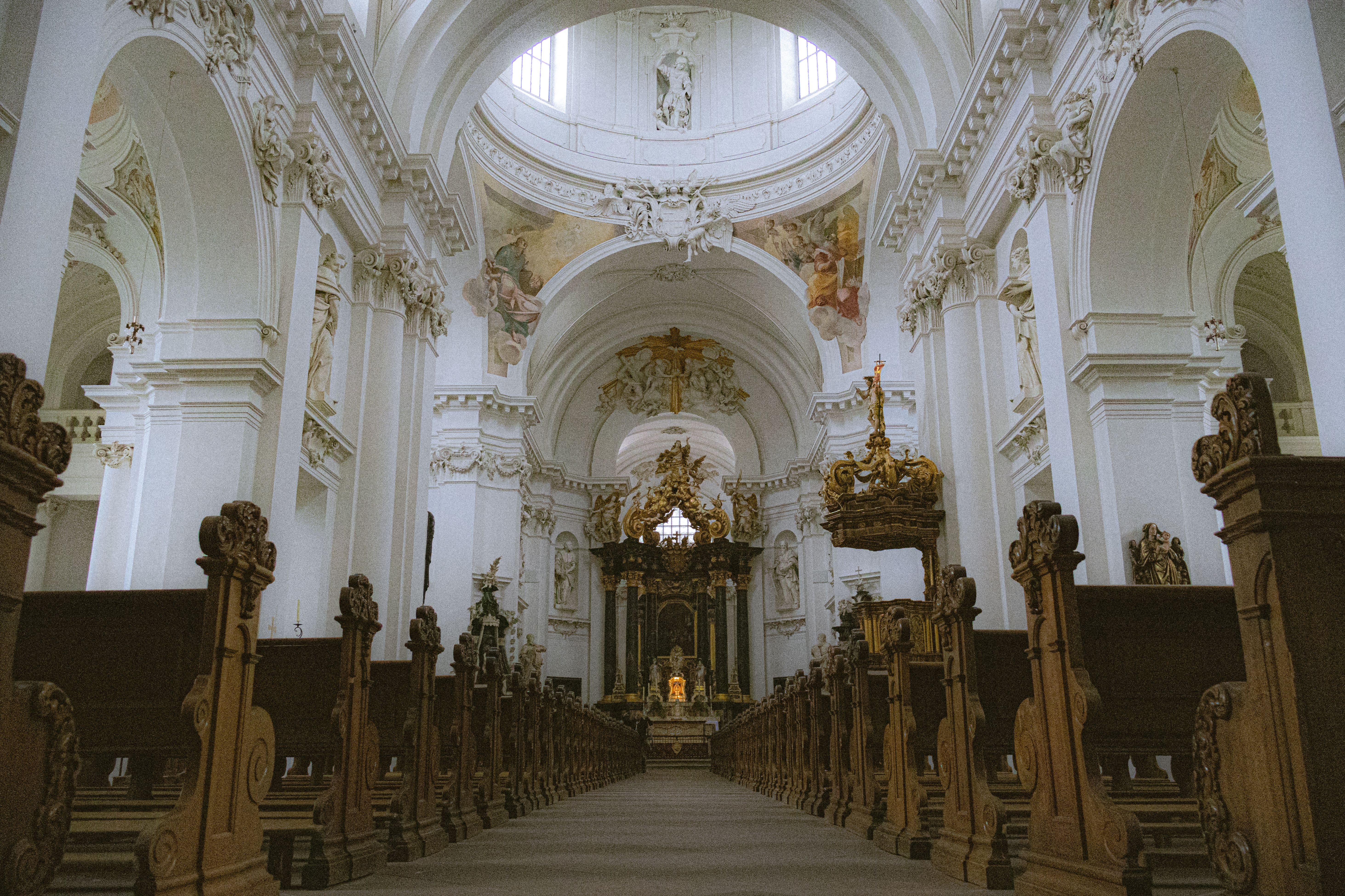 A church with a large altar and pews · Free Stock Photo