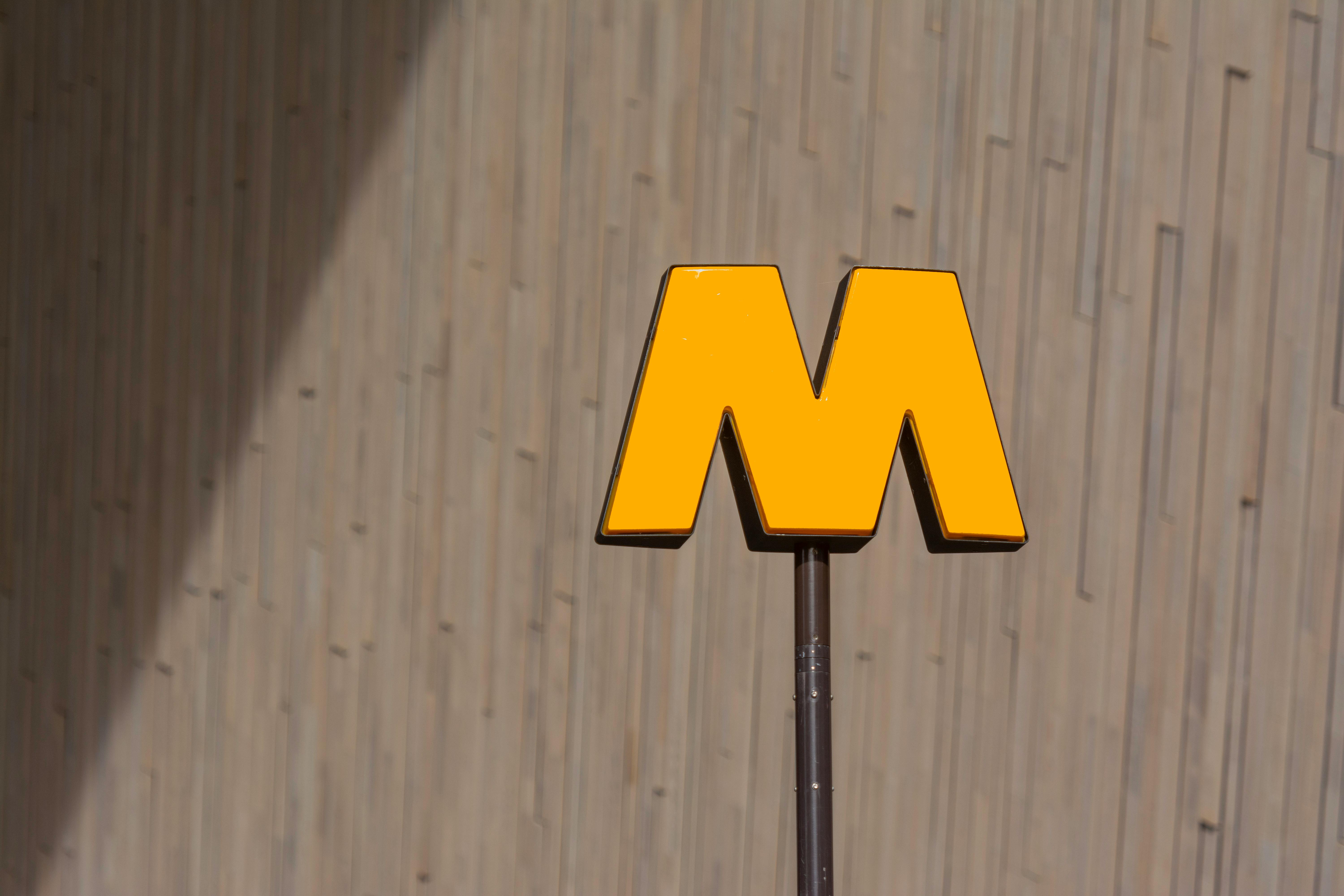 Yellow Metro Sign in Rotterdam · Free Stock Photo