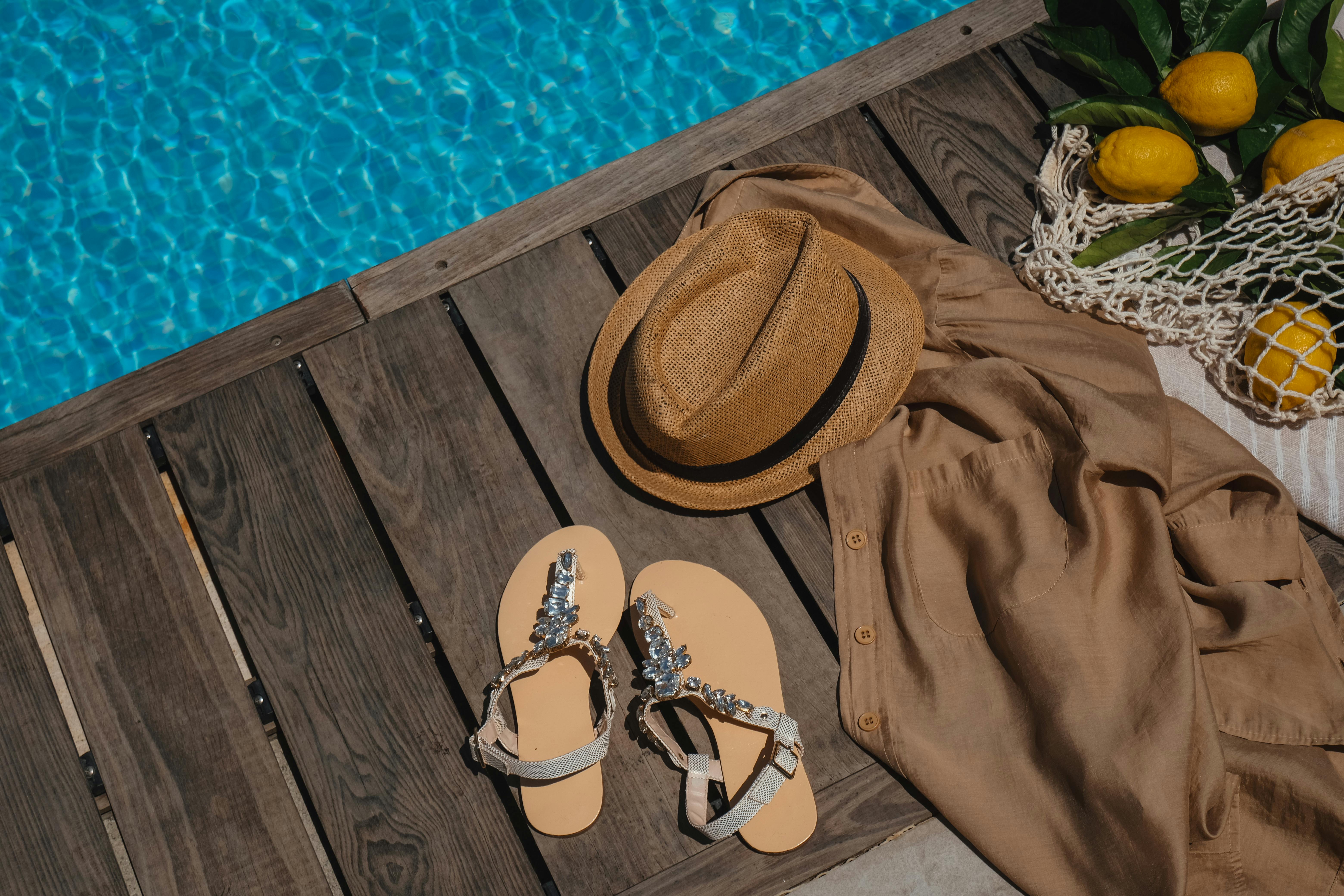 Clothing by a Swimming Pool · Free Stock Photo