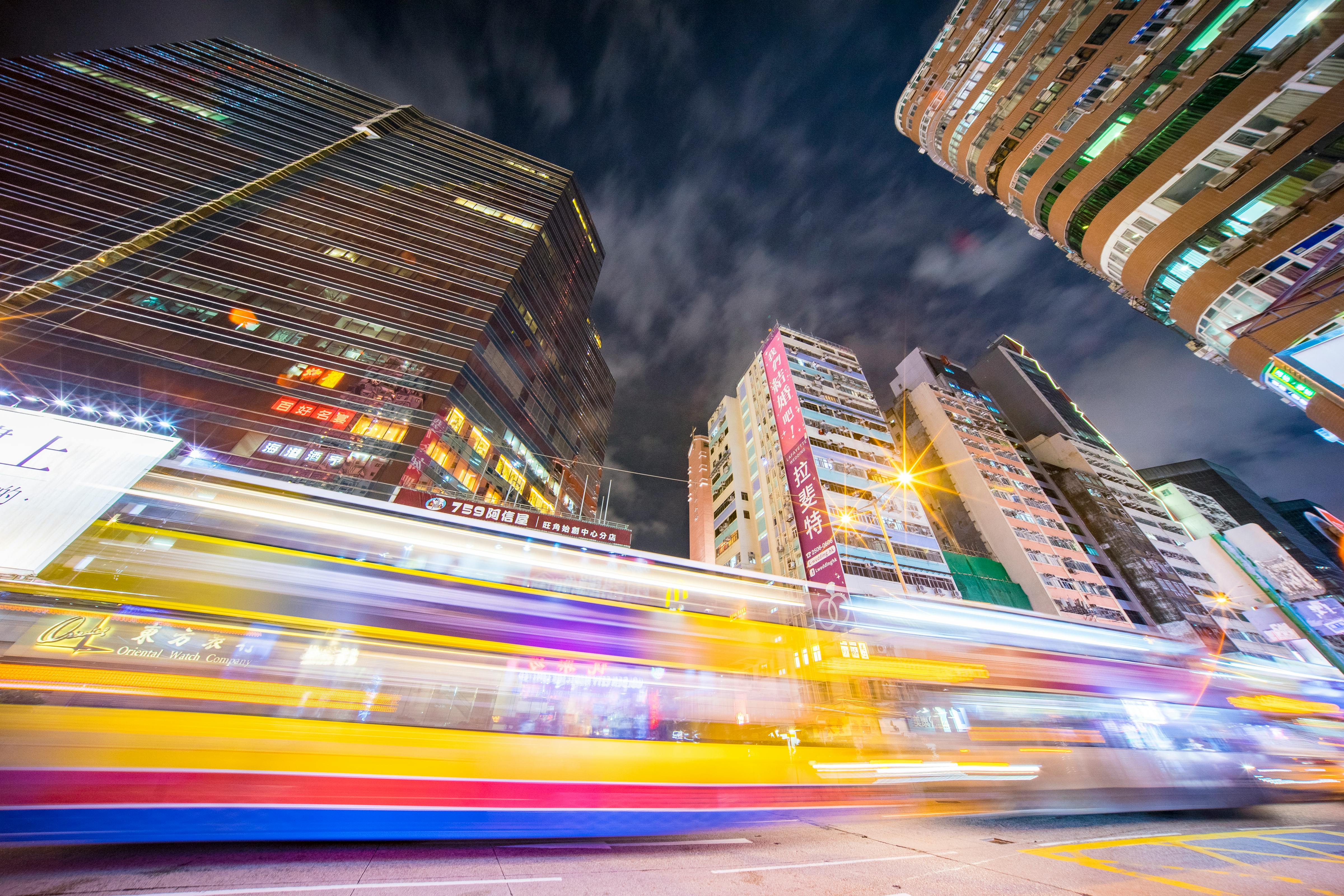 Time-lapse Photography of Road Near Buildings · Free Stock Photo