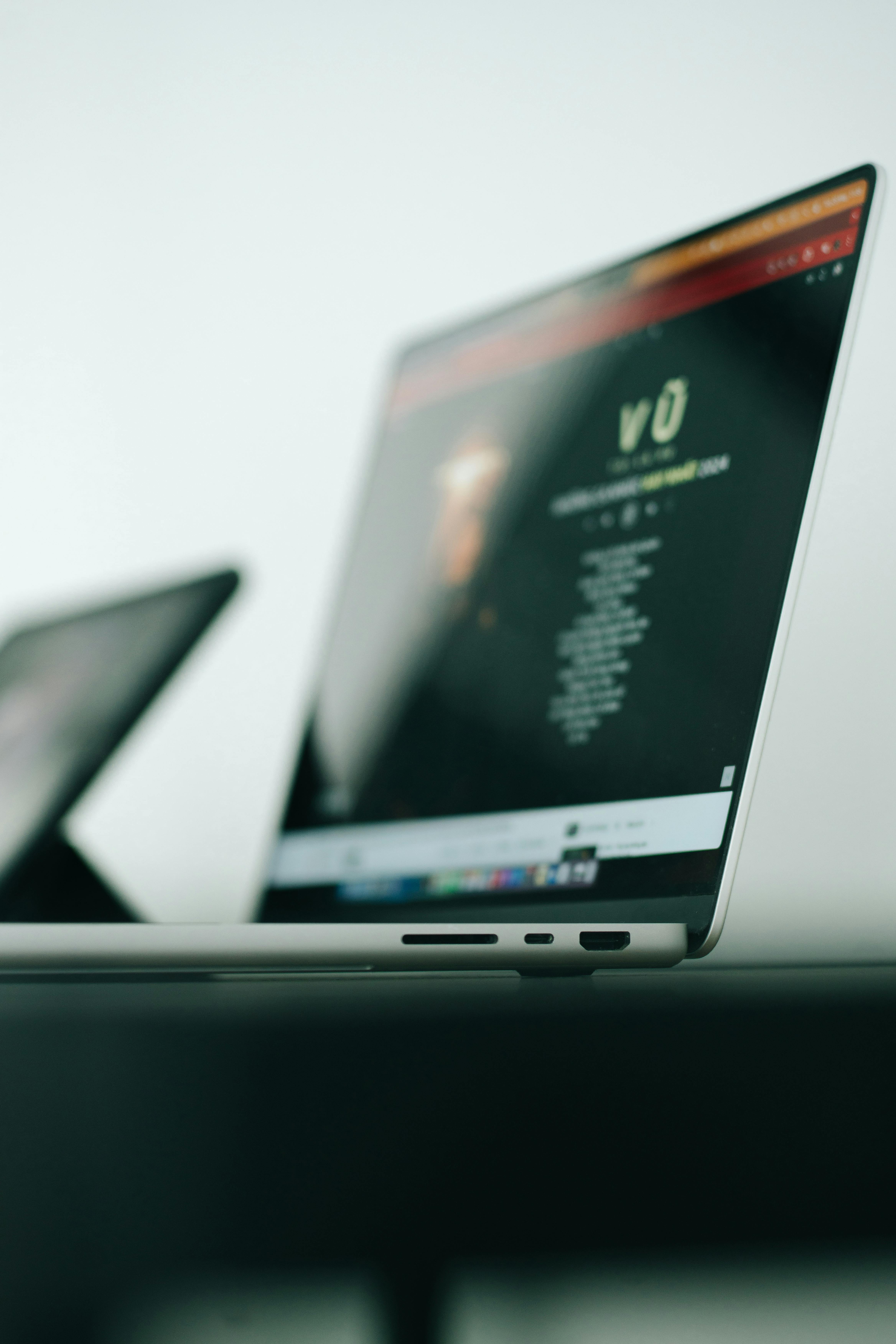 Black Framed Eyeglasses Beside Laptop Computer · Free Stock Photo