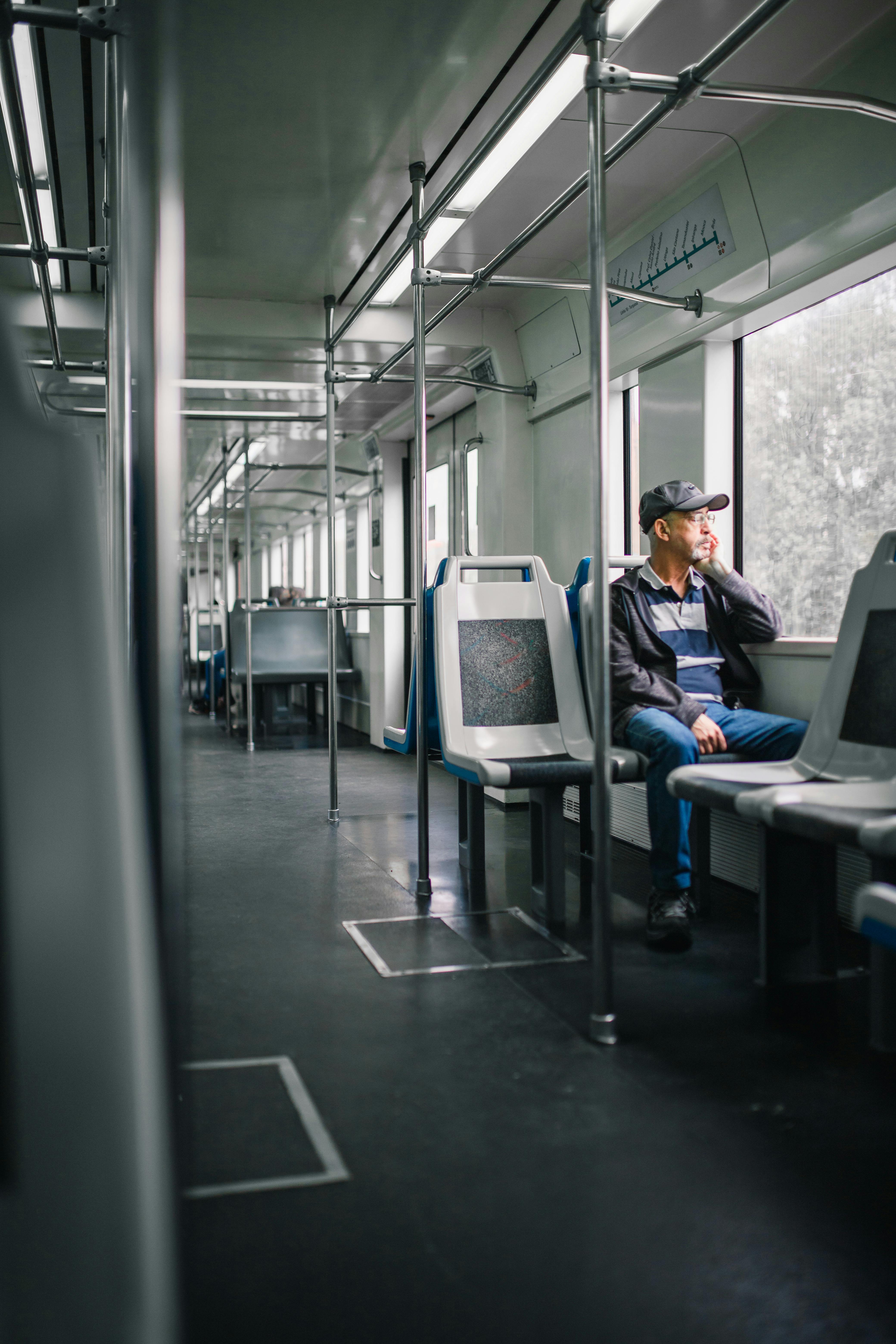 Man Sitting Inside Train · Free Stock Photo