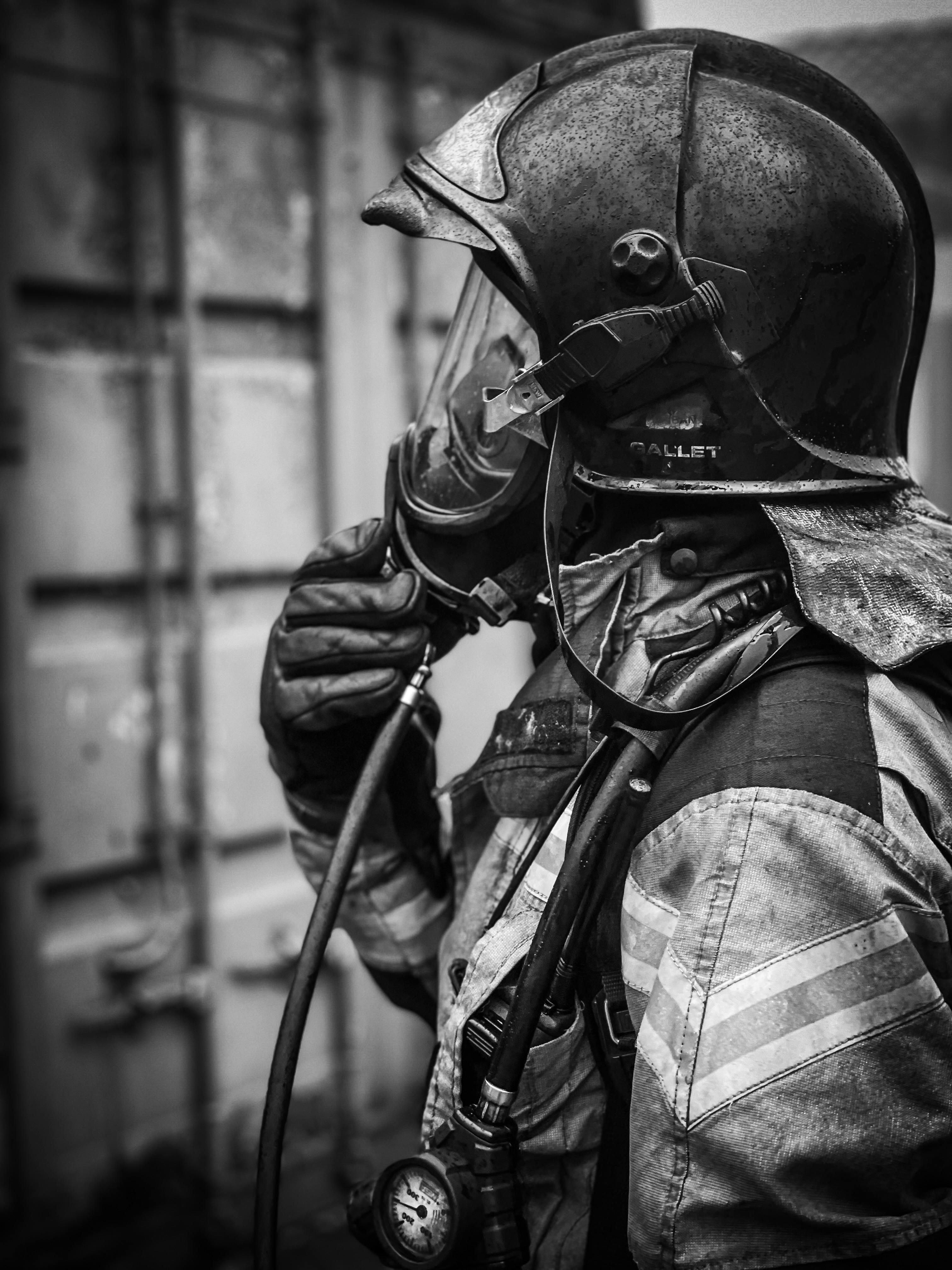 Photo of Firefighter Beside Building · Free Stock Photo