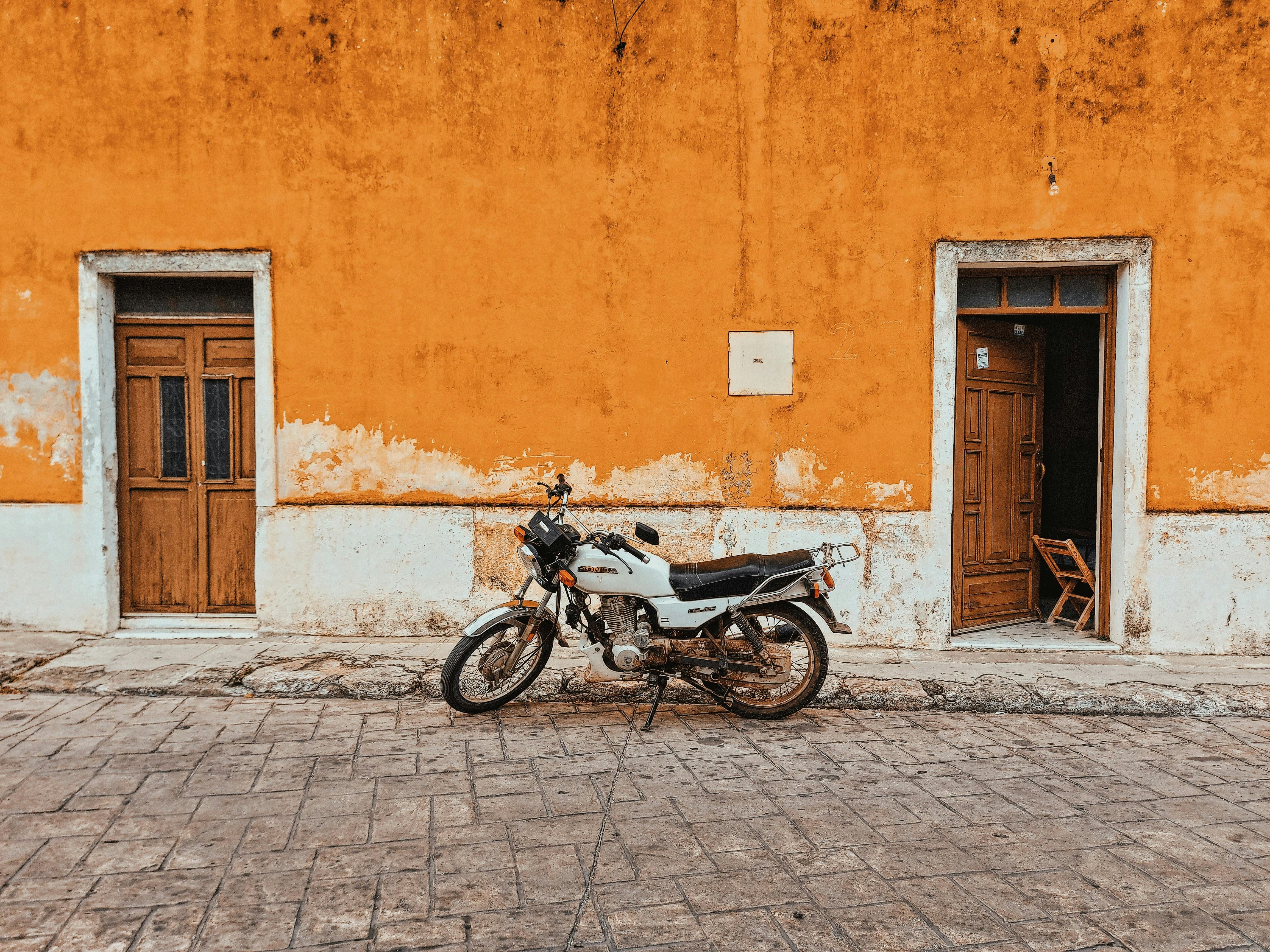 Motorbike on Street in front of Building · Free Stock Photo