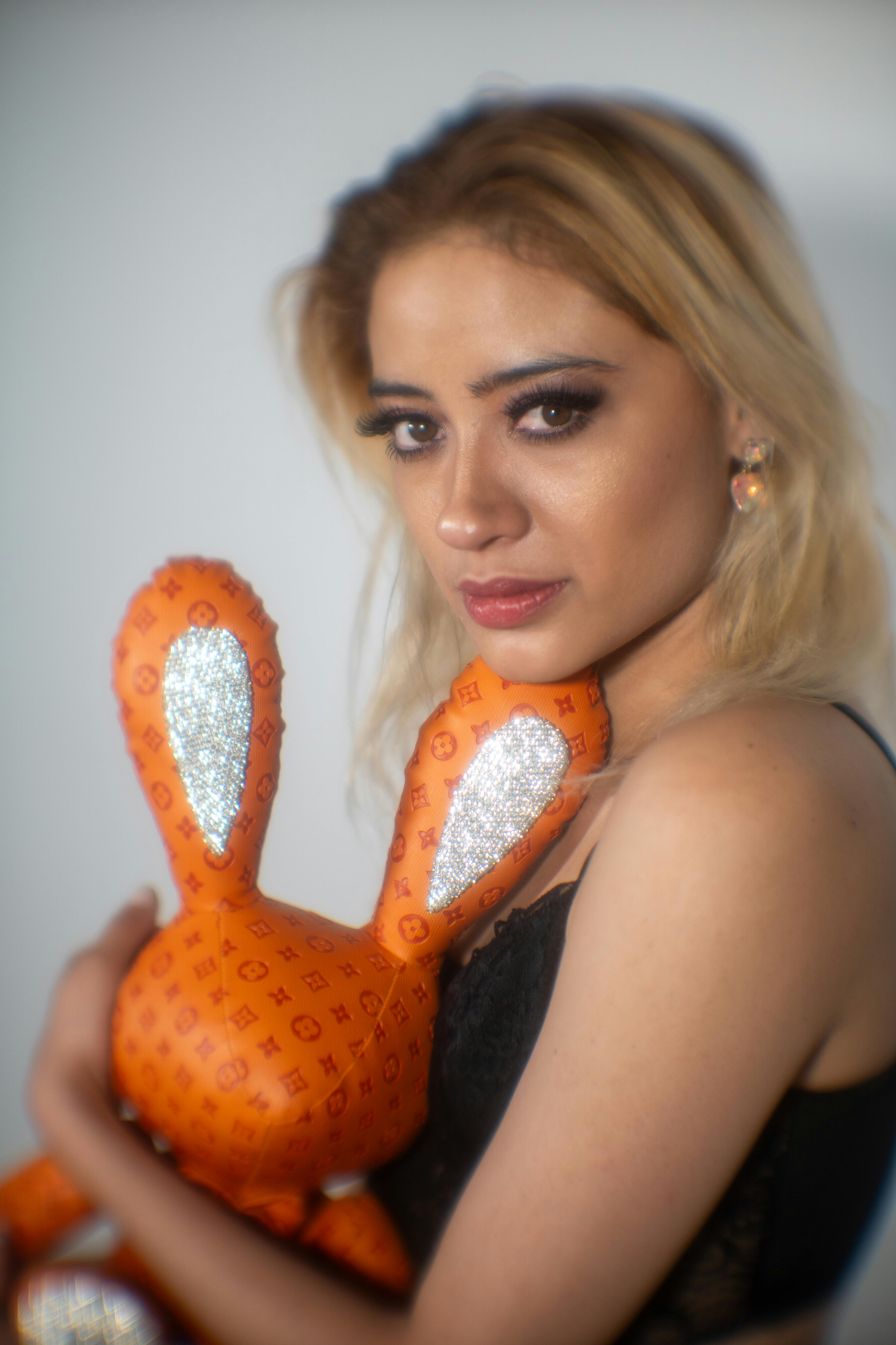 Portrait of Woman with Toy Rabbit · Free Stock Photo