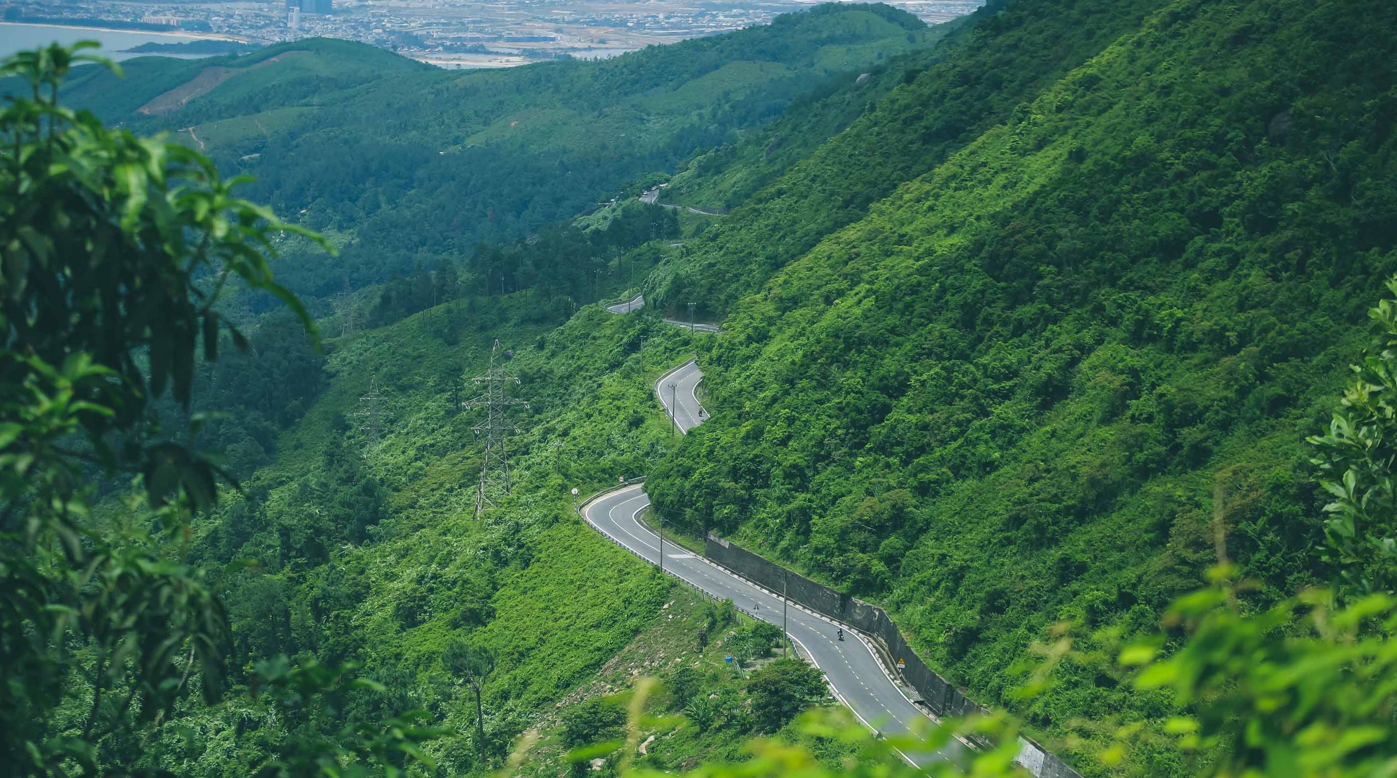 Aerial View of a Road on the Hillside among Lush Greenery · Free Stock ...
