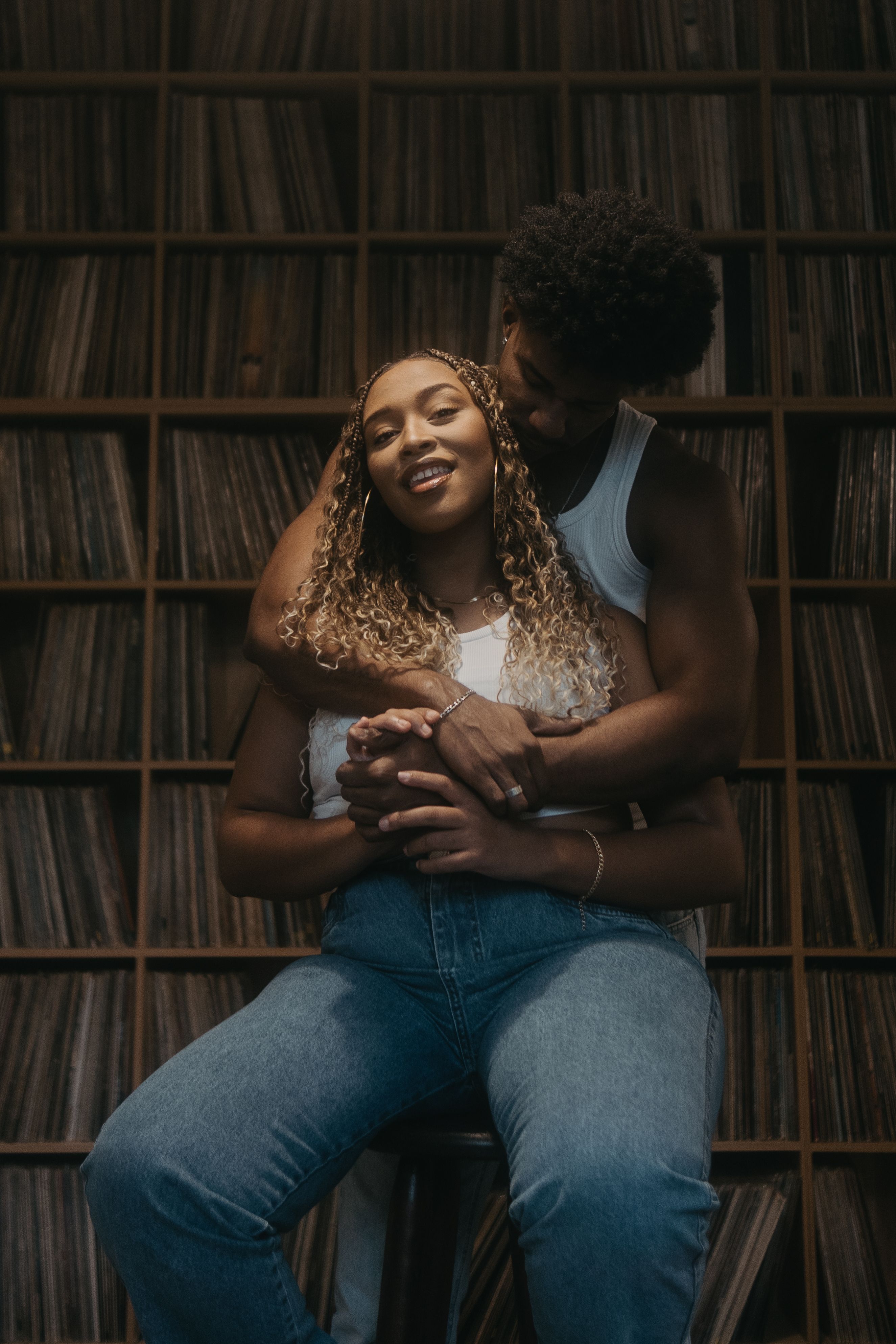 Man Hugging Smiling Woman in Jeans · Free Stock Photo
