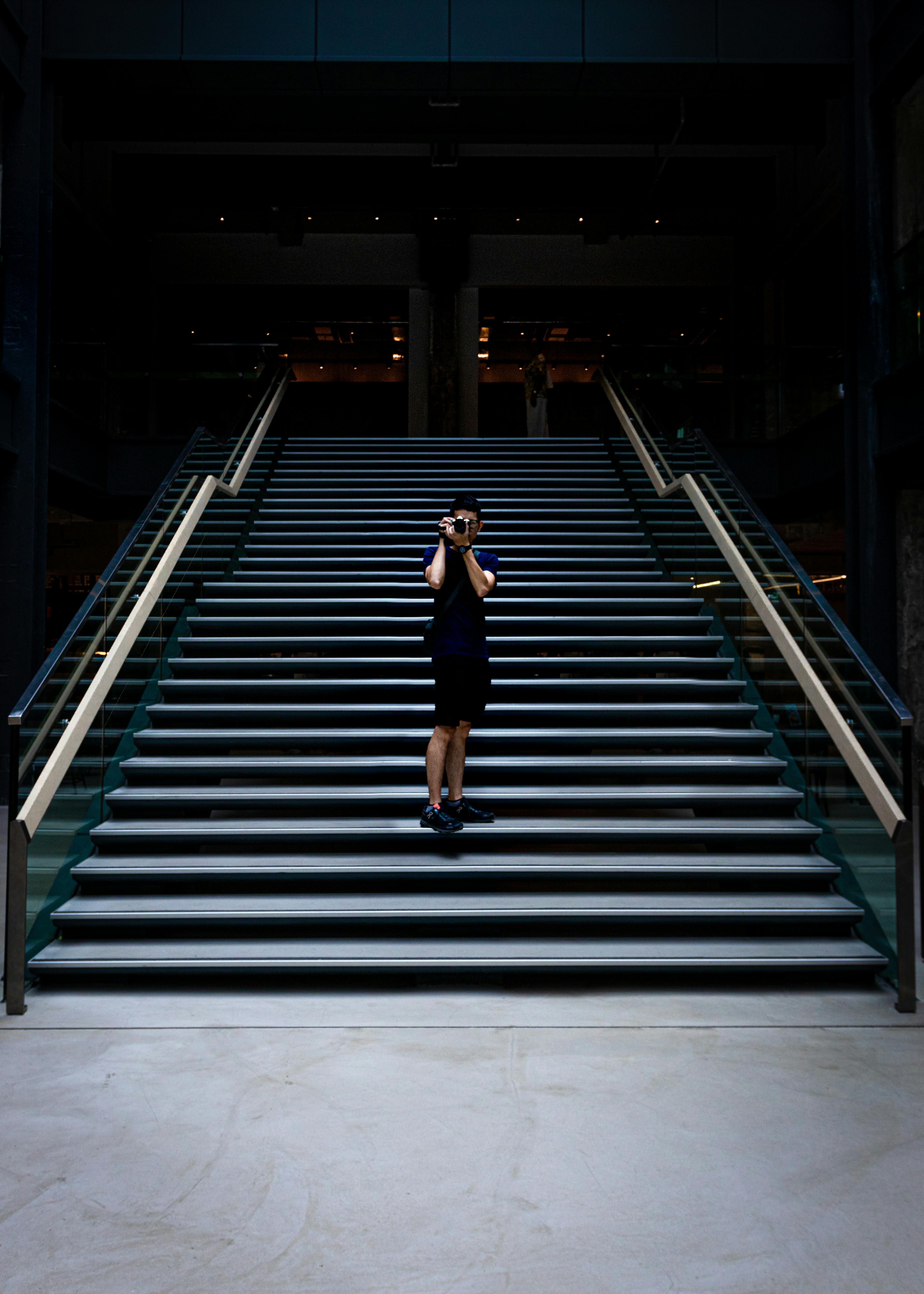 Man Standing on Stair · Free Stock Photo
