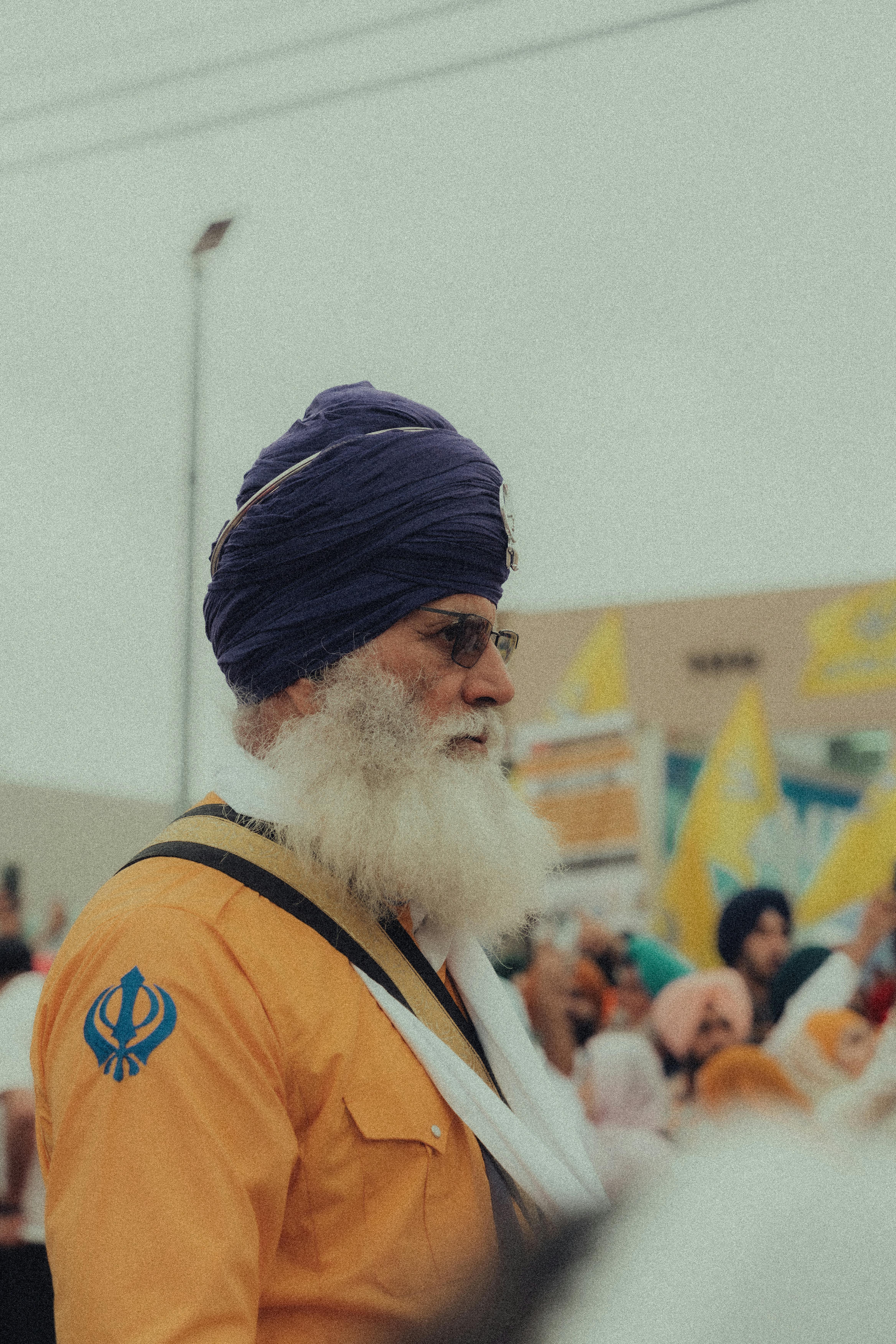 Elderly Sikh Man Wearing a Traditional Blue Turban · Free Stock Photo