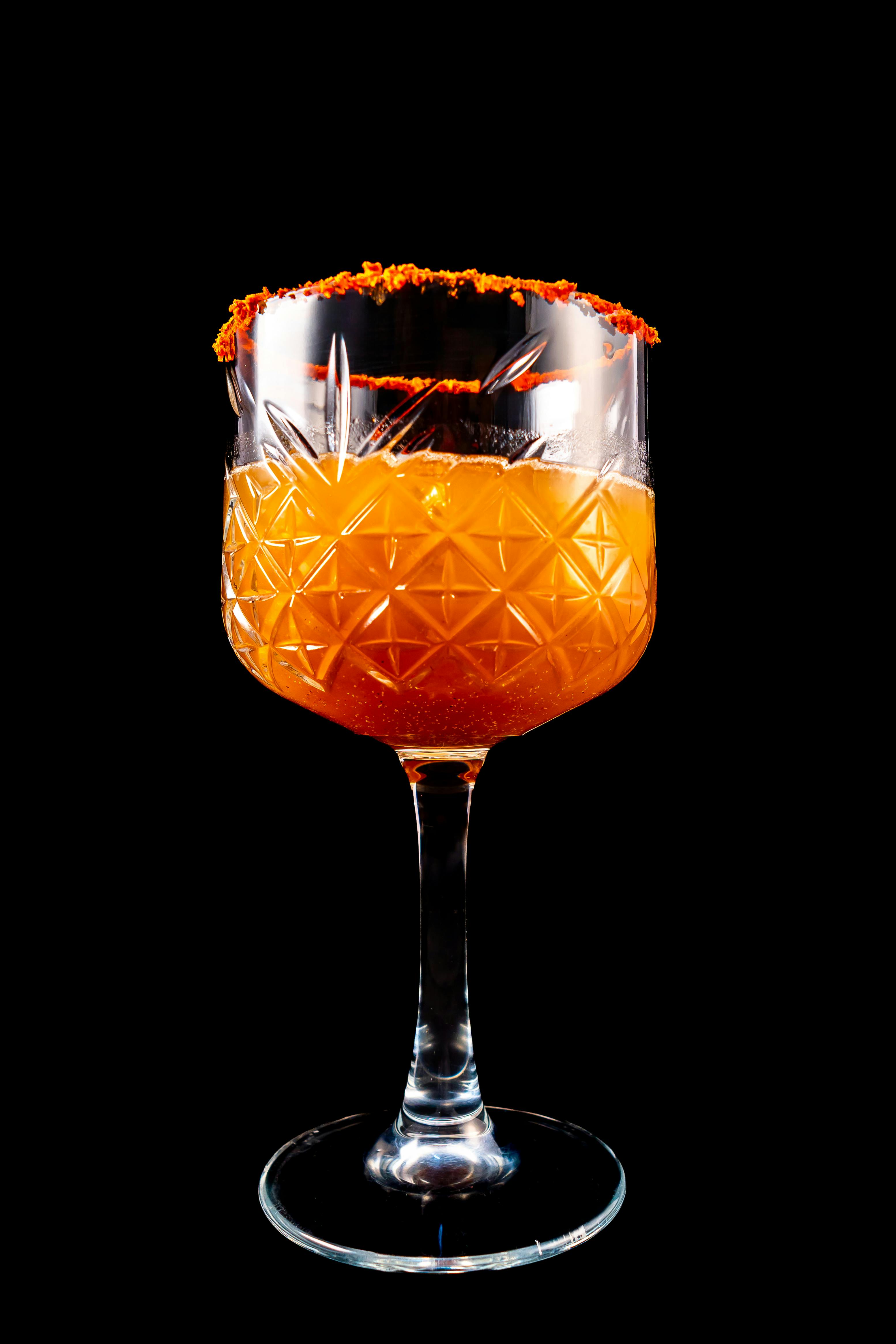 Glass of Orange Cocktail · Free Stock Photo