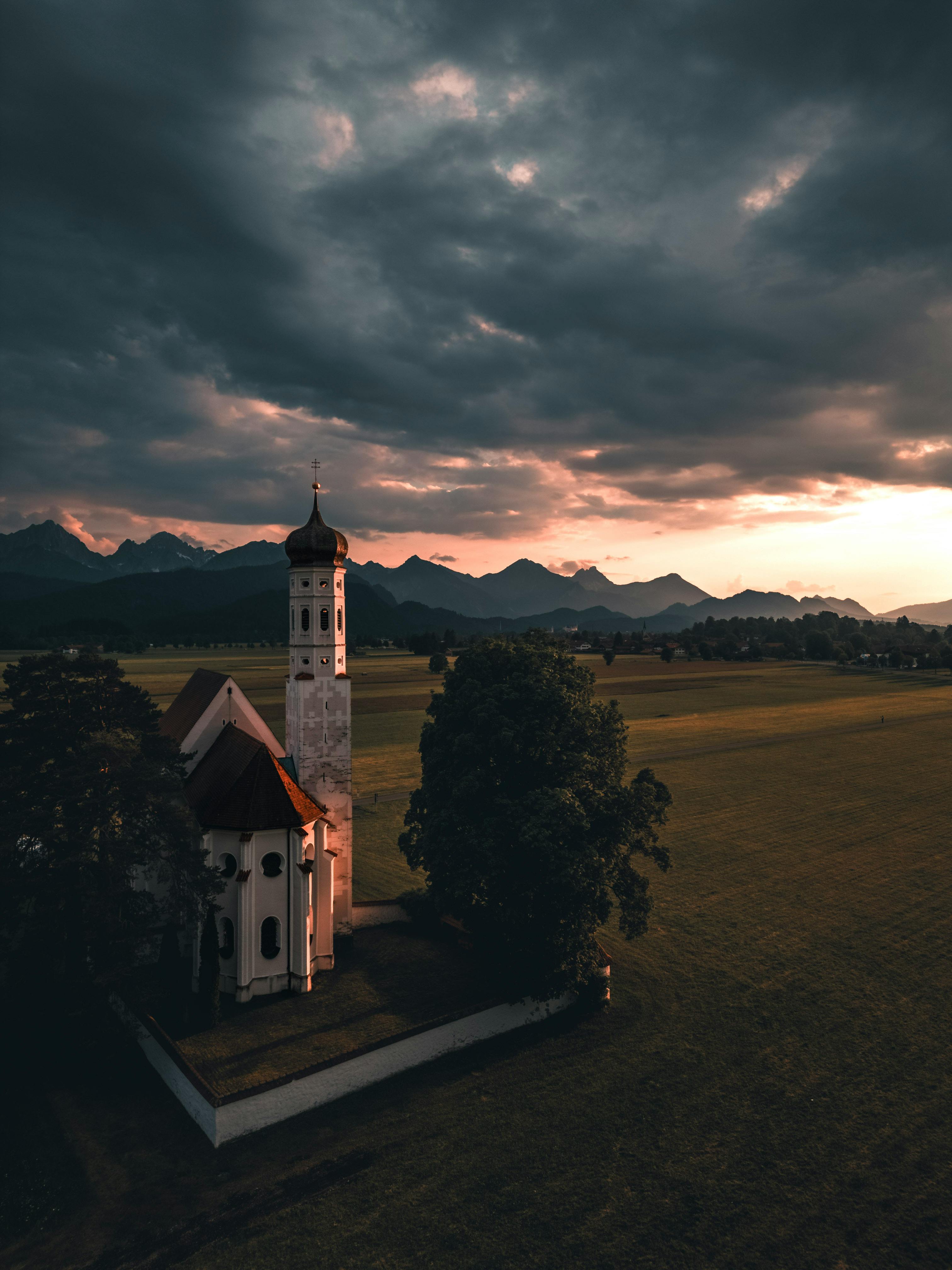 Aerial View of Saint Coloman Church Surrounded by Fields · Free Stock Photo